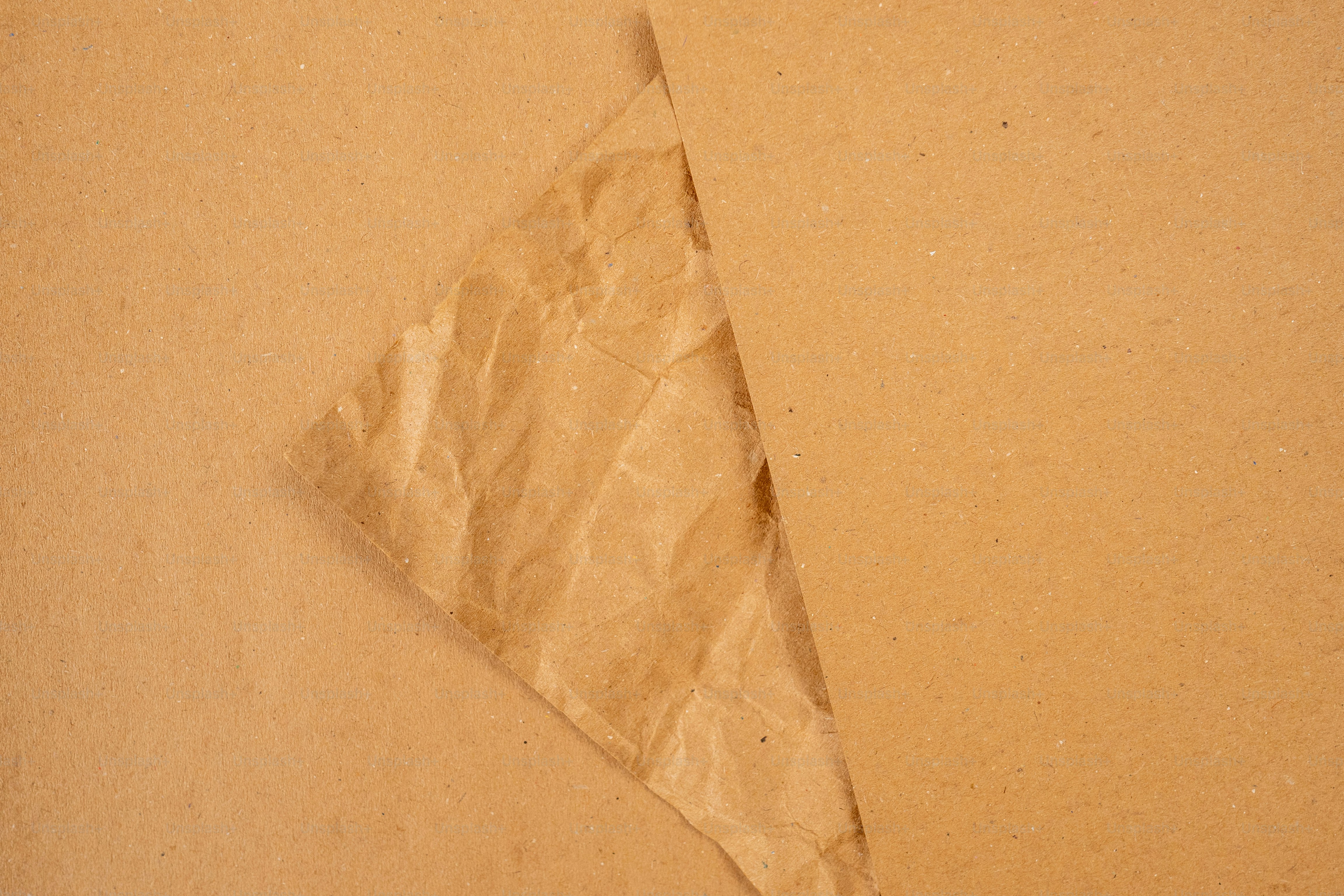 A piece of paper that has been torn in half photo – Background Image on ...