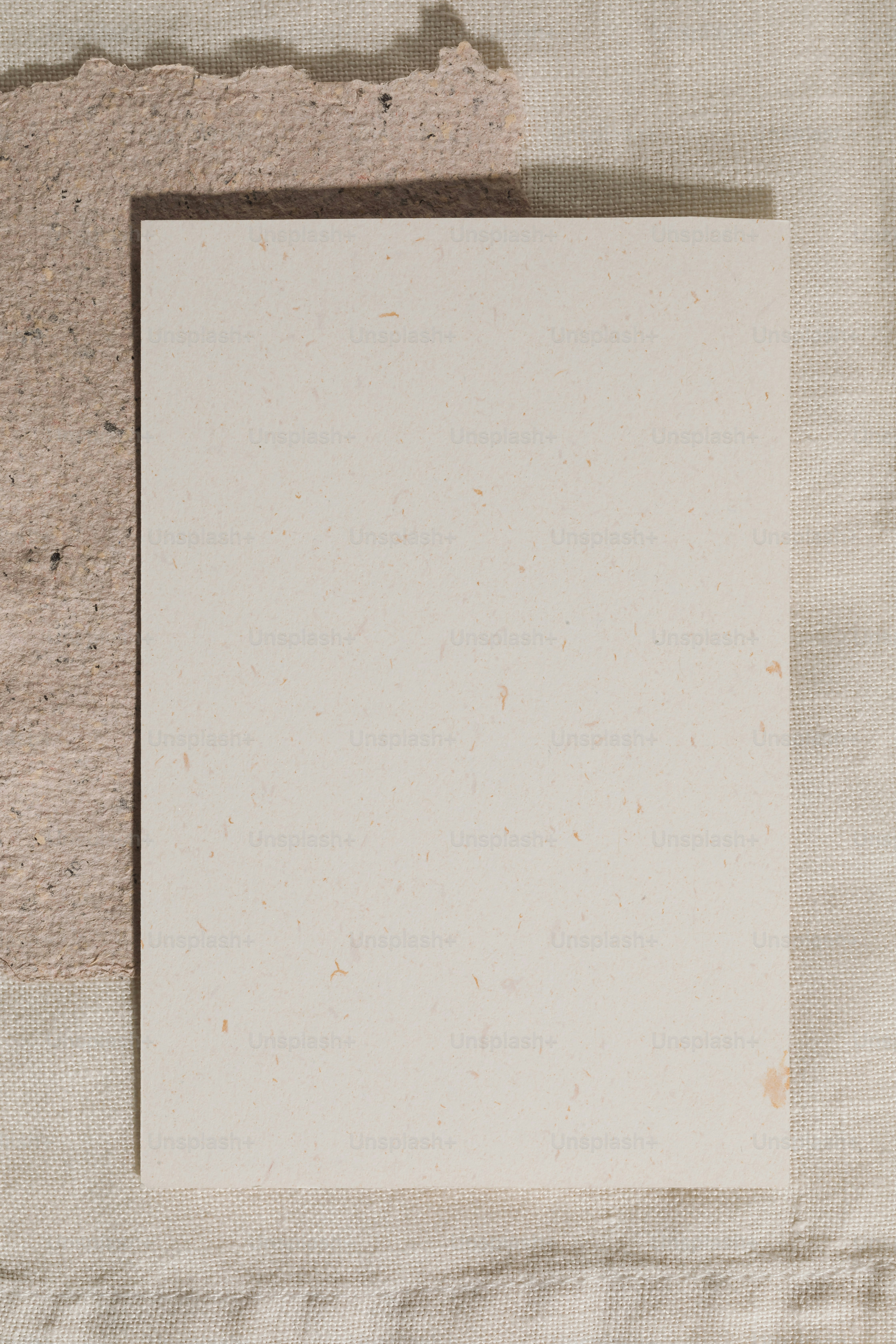 A couple of pieces of paper sitting on top of each other photo ...