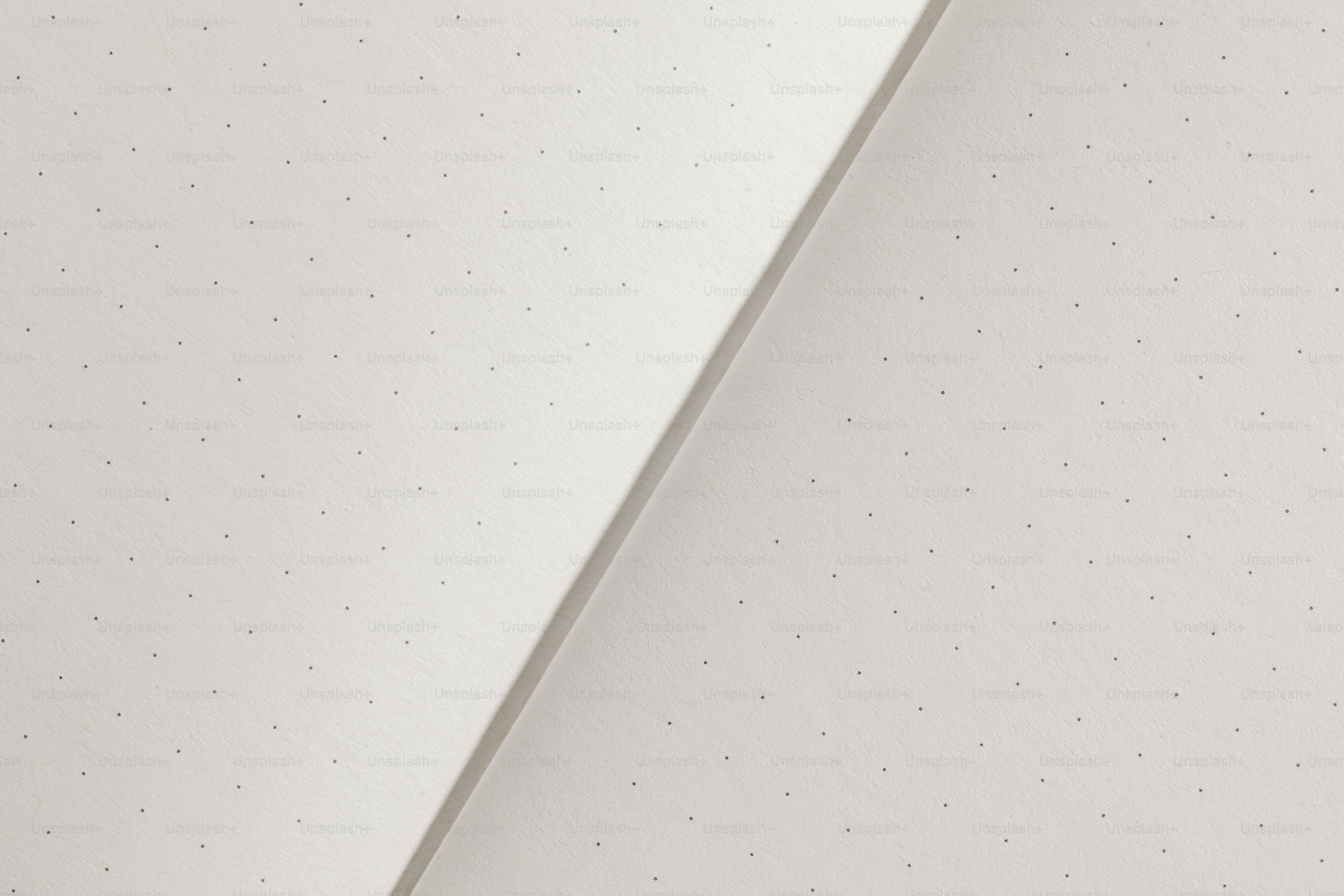 A close up of a white sheet of paper photo – Background Image on Unsplash