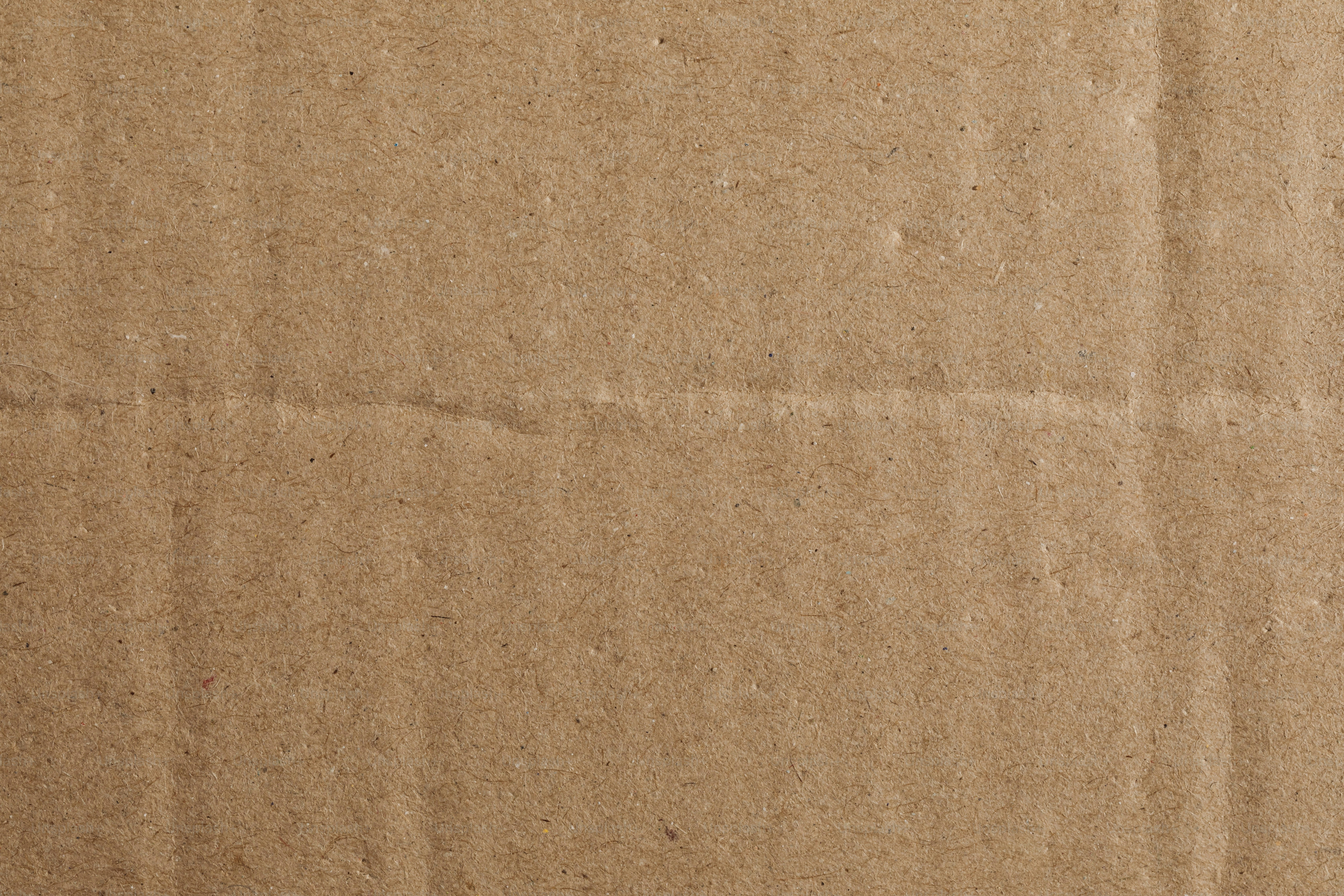 A close up of a brown cardboard box photo – Paper texture Image on Unsplash