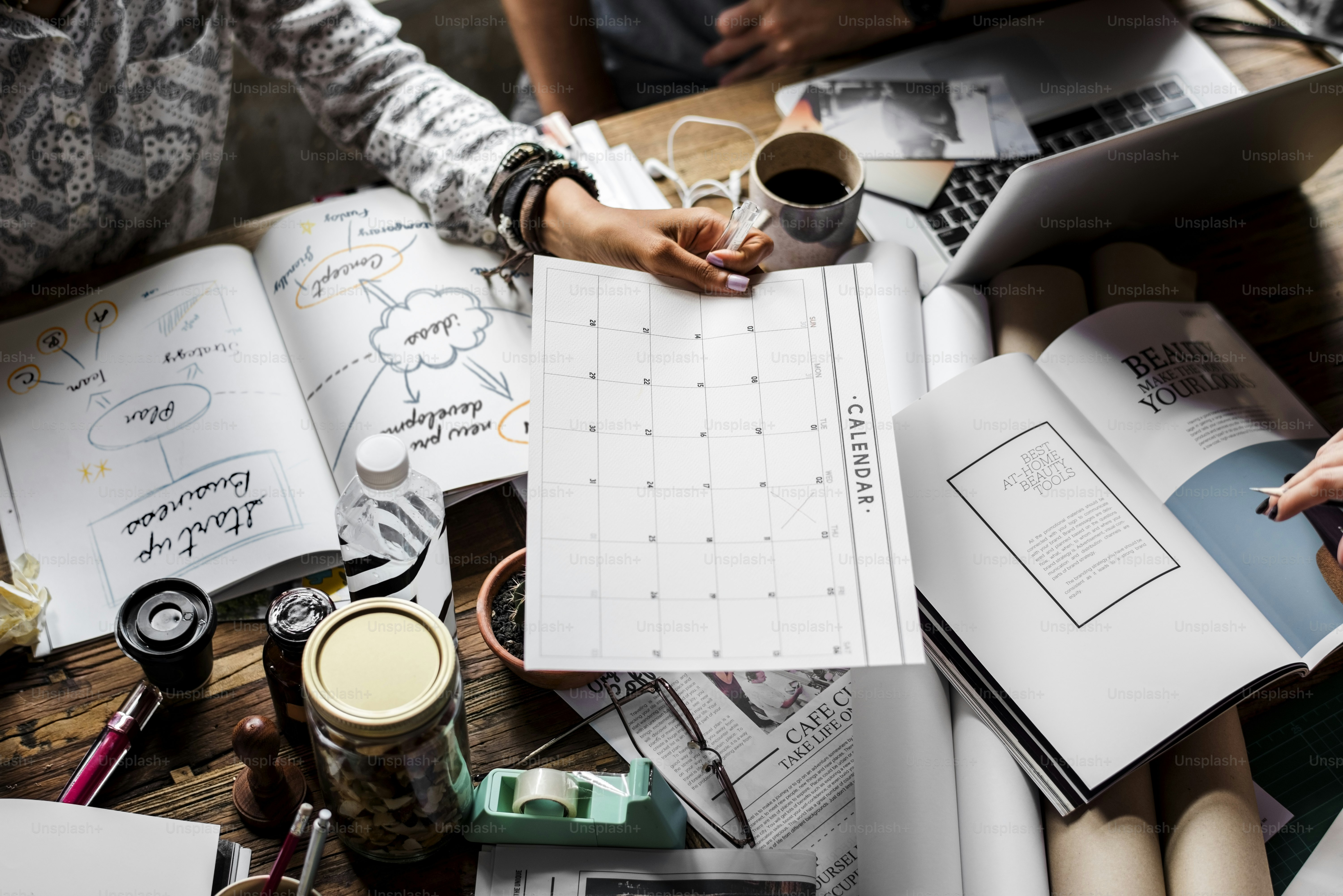 Hand Holding Calendar Meeting Talking with Colleagues at Office photo ...