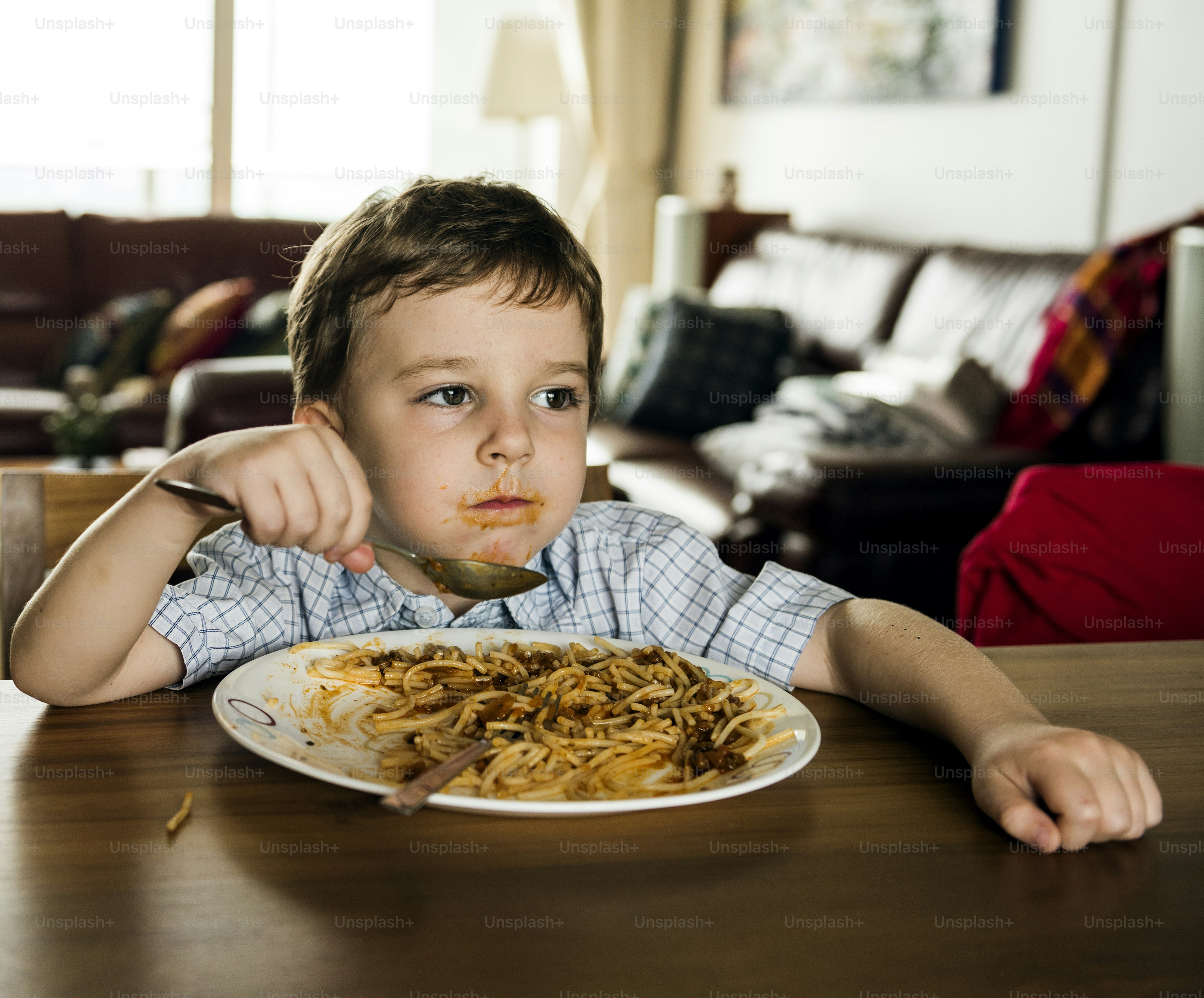 Boy Mealtome Eating Spaghetti at Home photo – Boys Image on Unsplash
