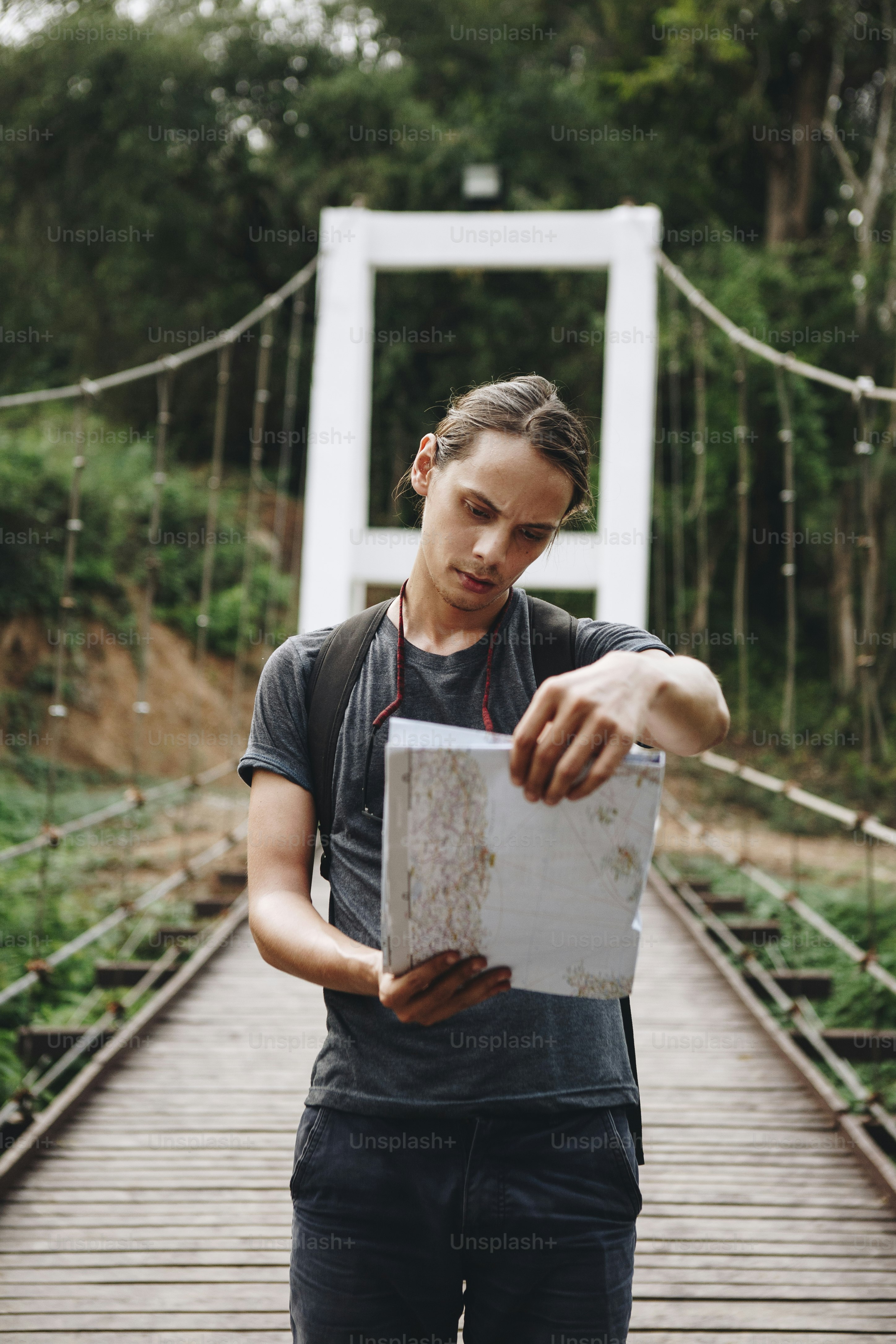 Caucasian man looking at a map travel and explore concept*** This map ...