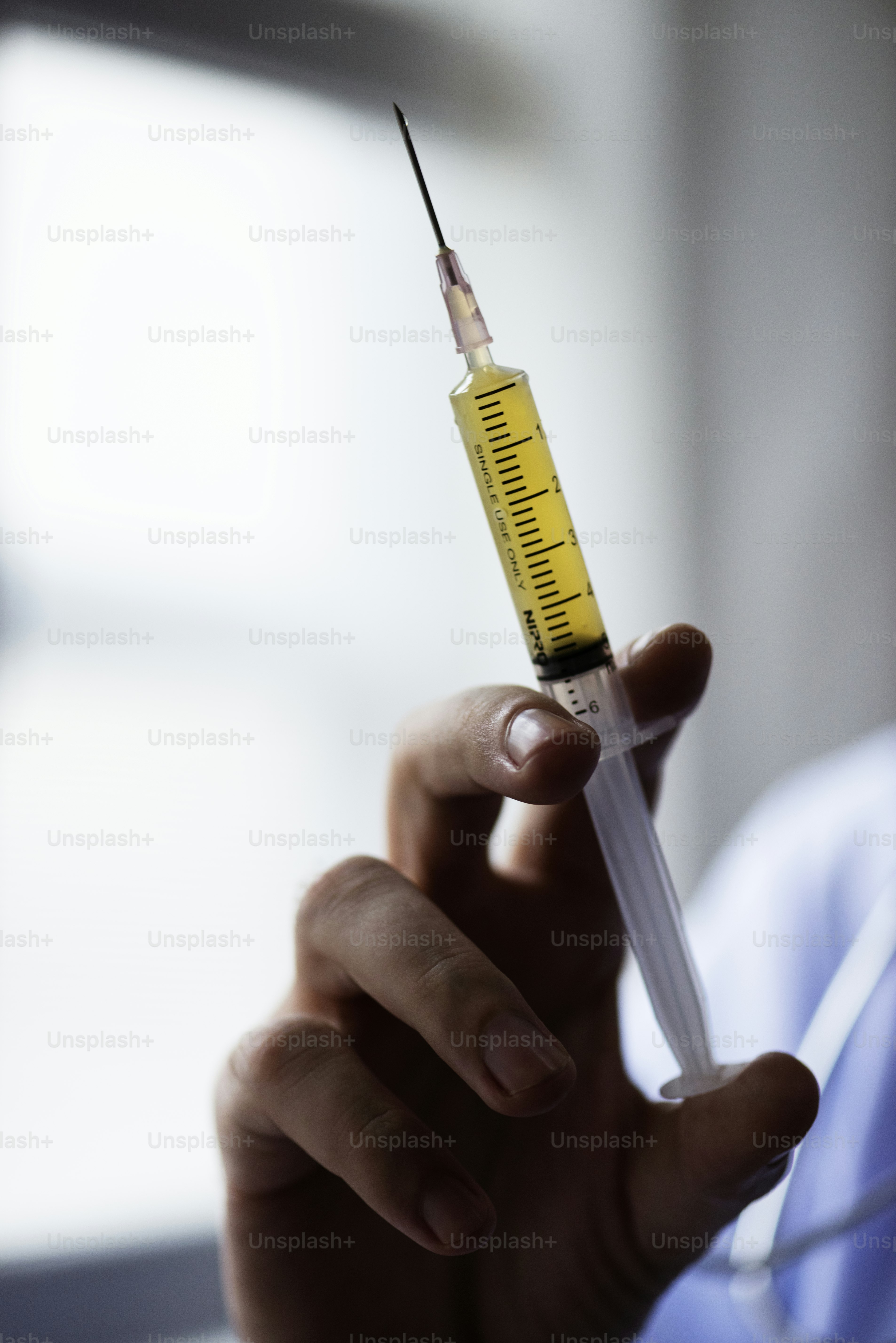 Vaccine in injection syringe photo – Illness prevention Image on Unsplash