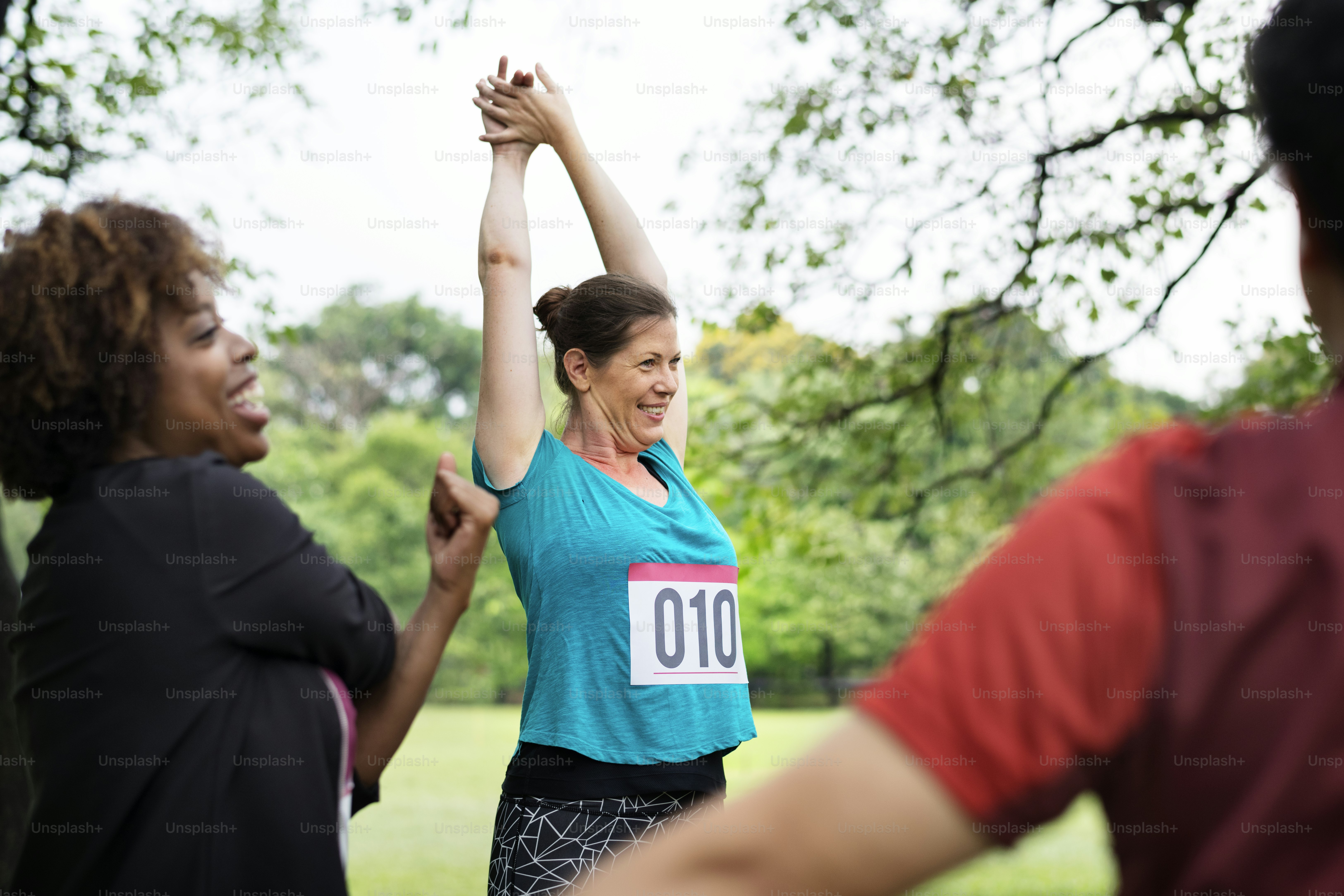 Group of diverse athlete are stretching their muscle photo – People ...