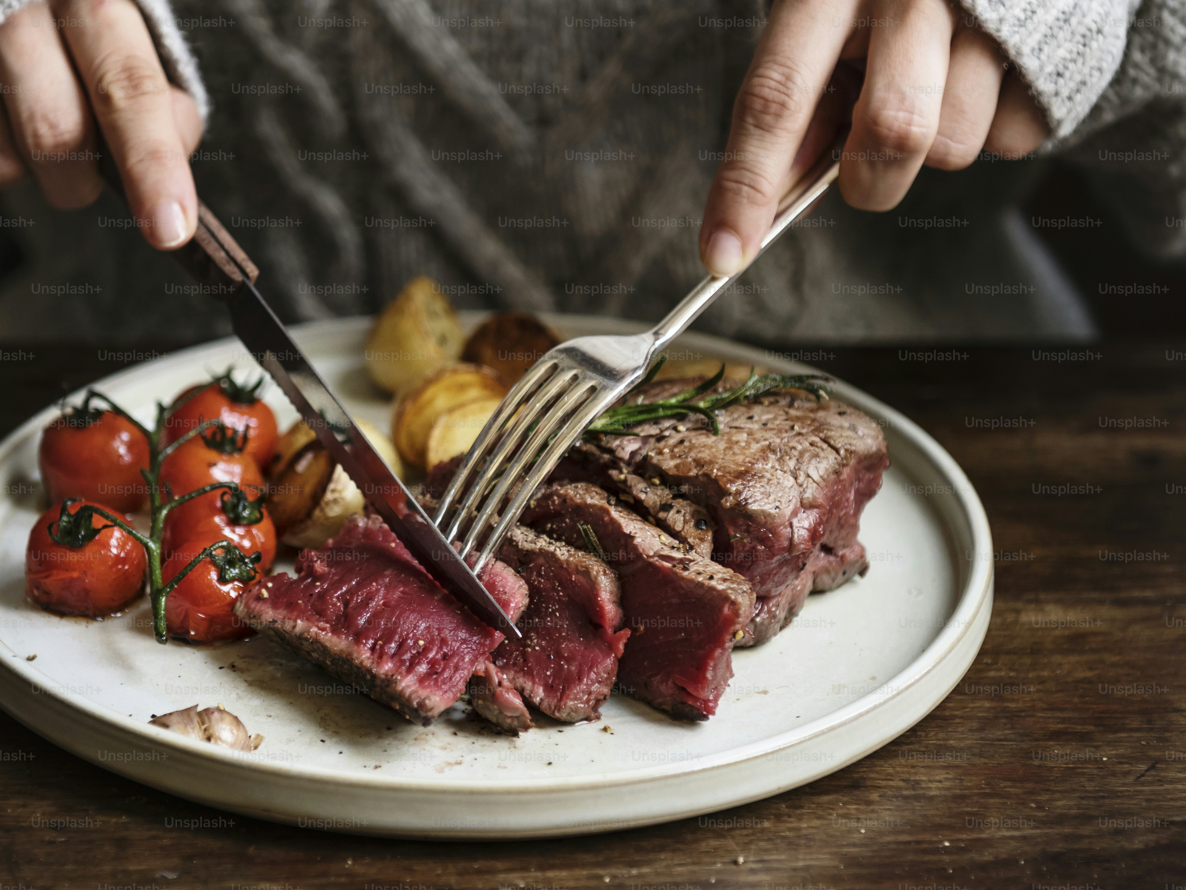 Close up of a cutting a fillet steak food photography recipe idea photo ...