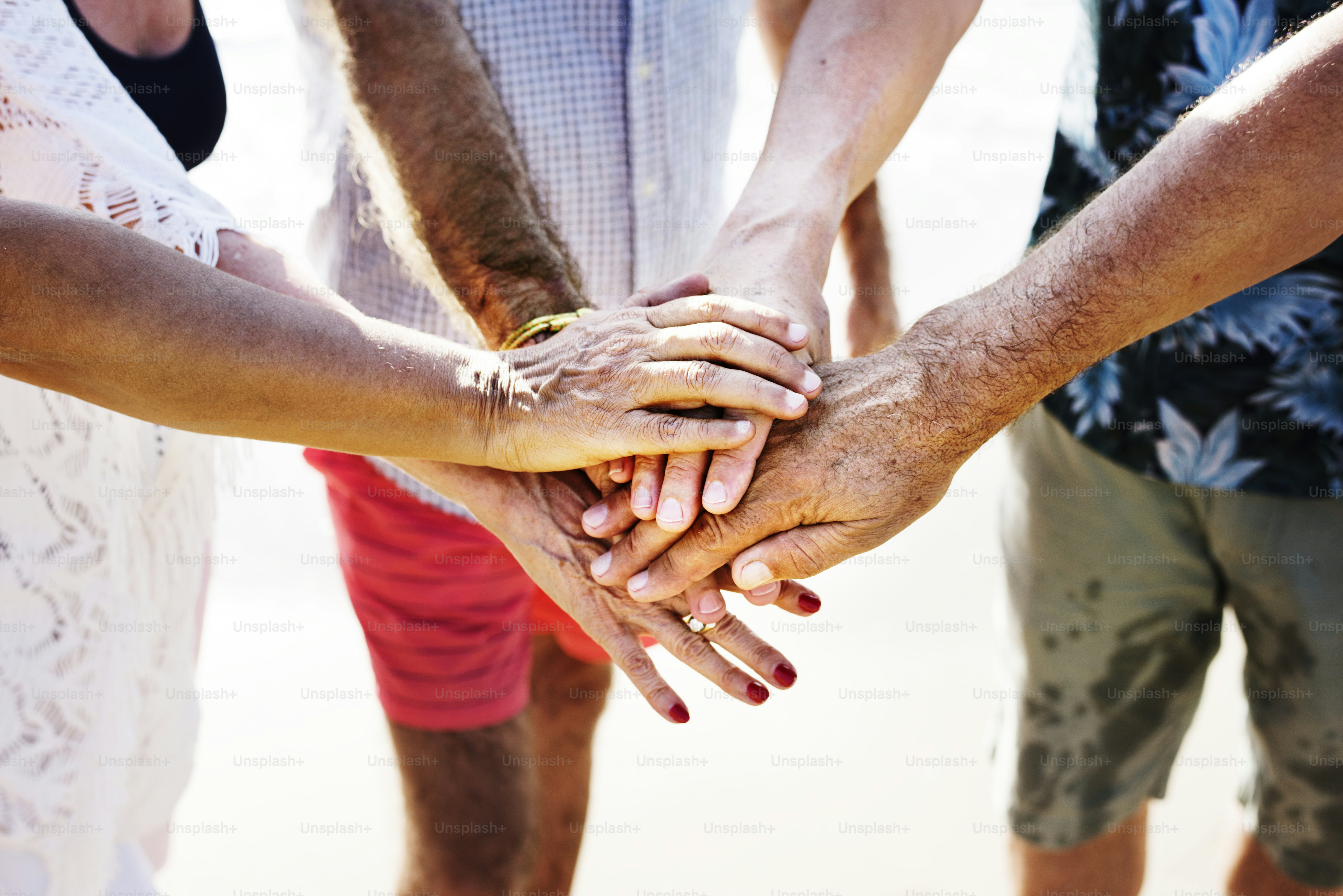 Senior hand stack photo – Stacked hands Image on Unsplash