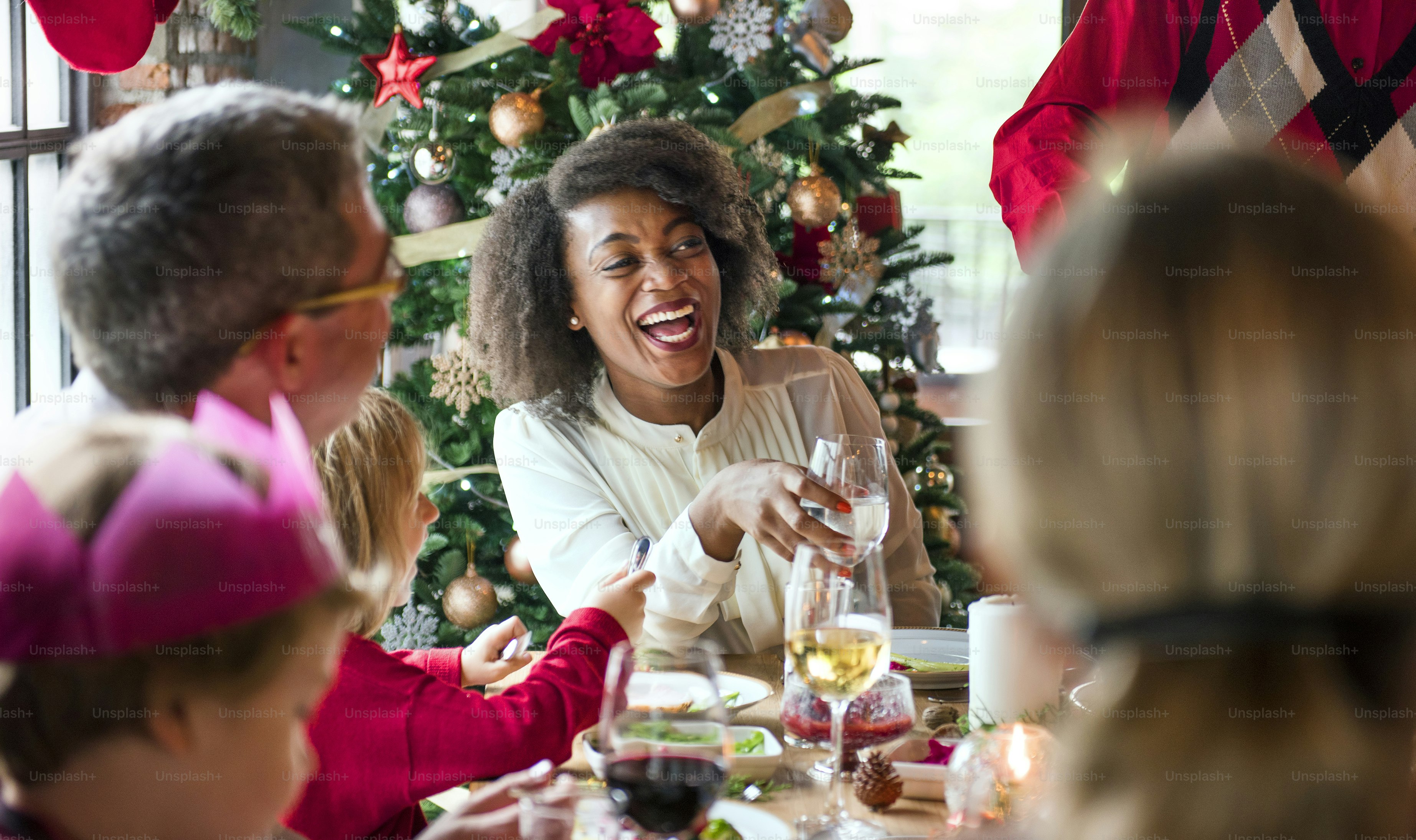 Group of diverse people are gathering for christmas holiday photo ...