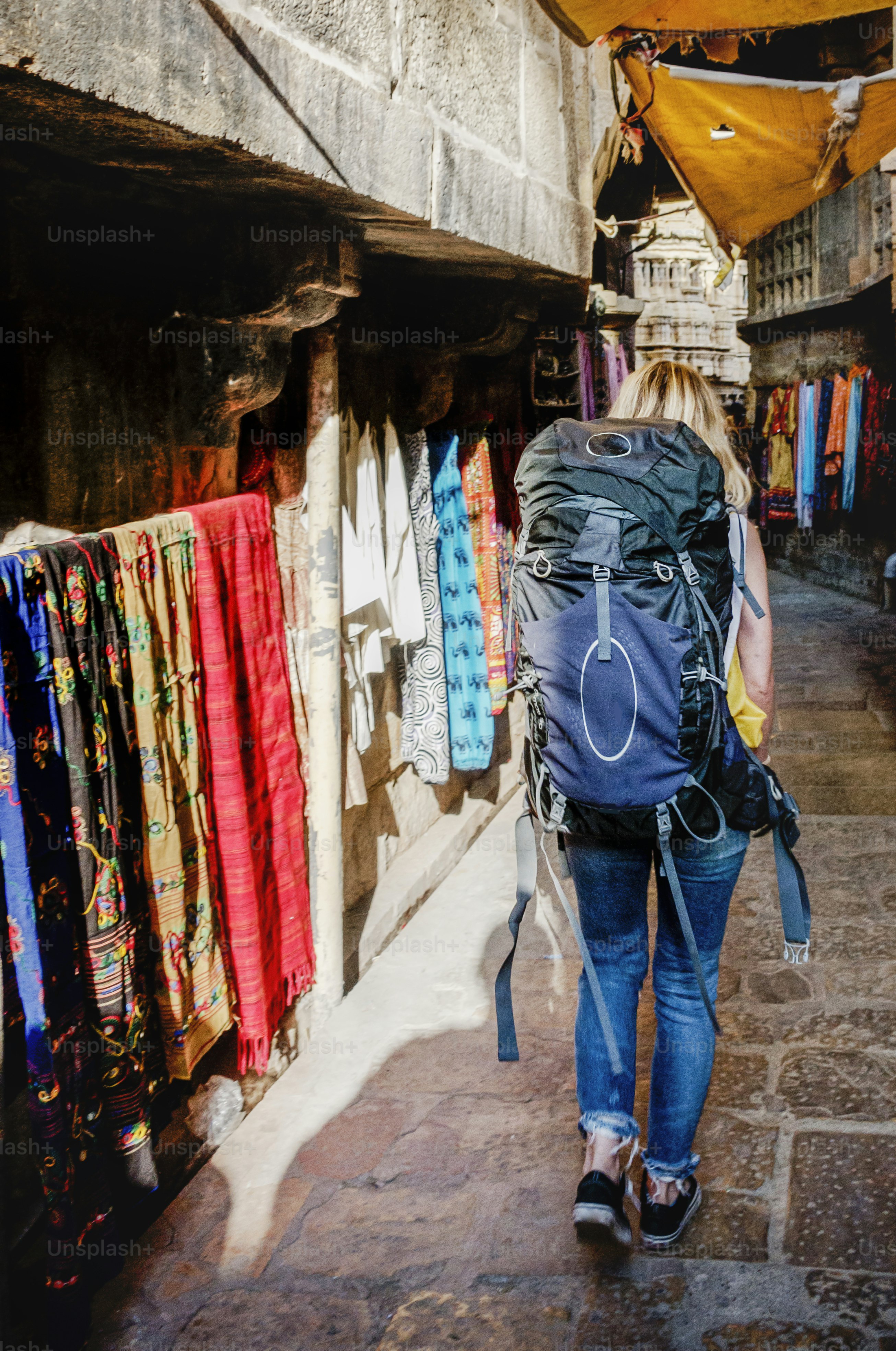 Western backpacker woman exploring India photo – Human back Image on ...