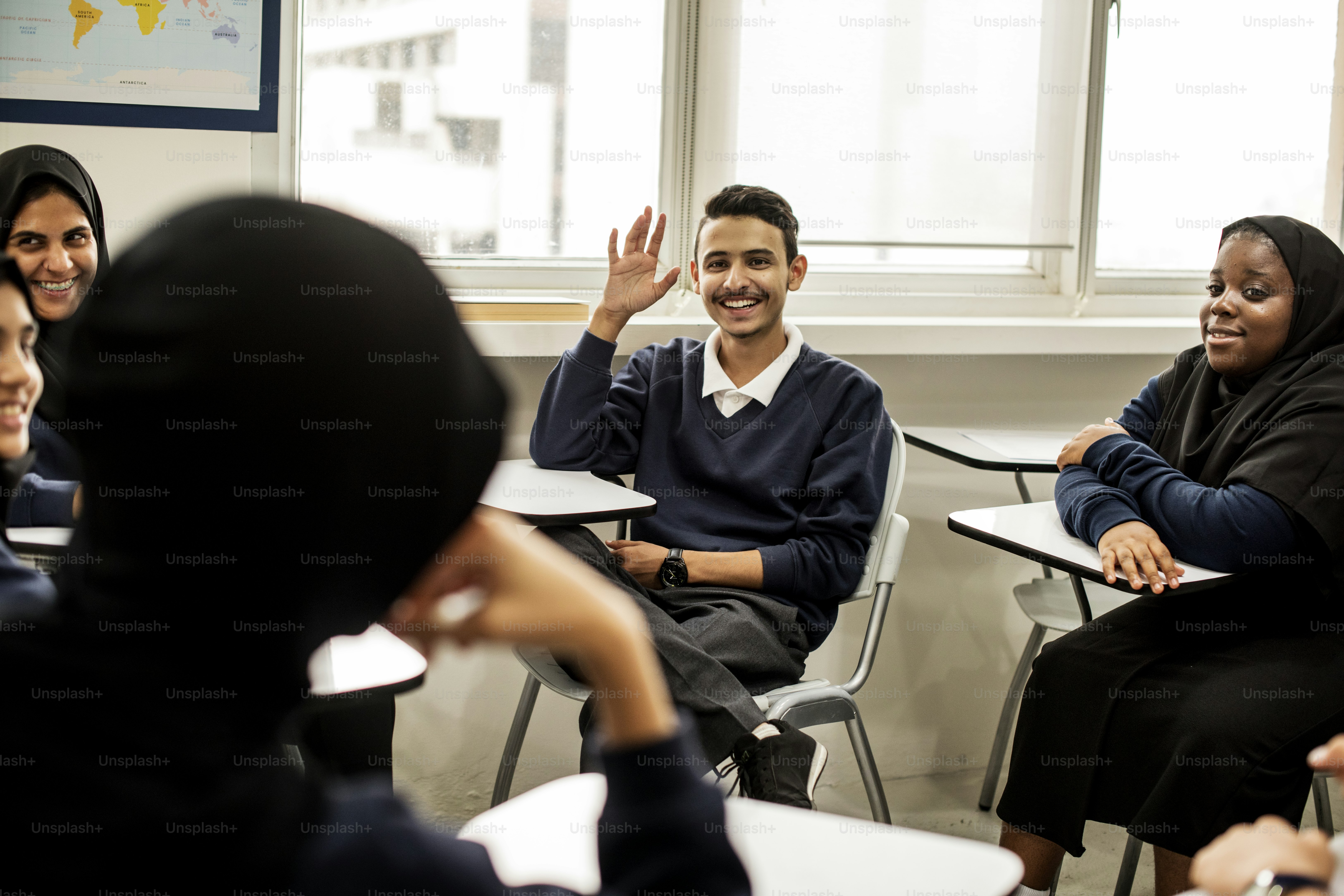 Diverse muslim children studying in classroom photo – Pakistani ...