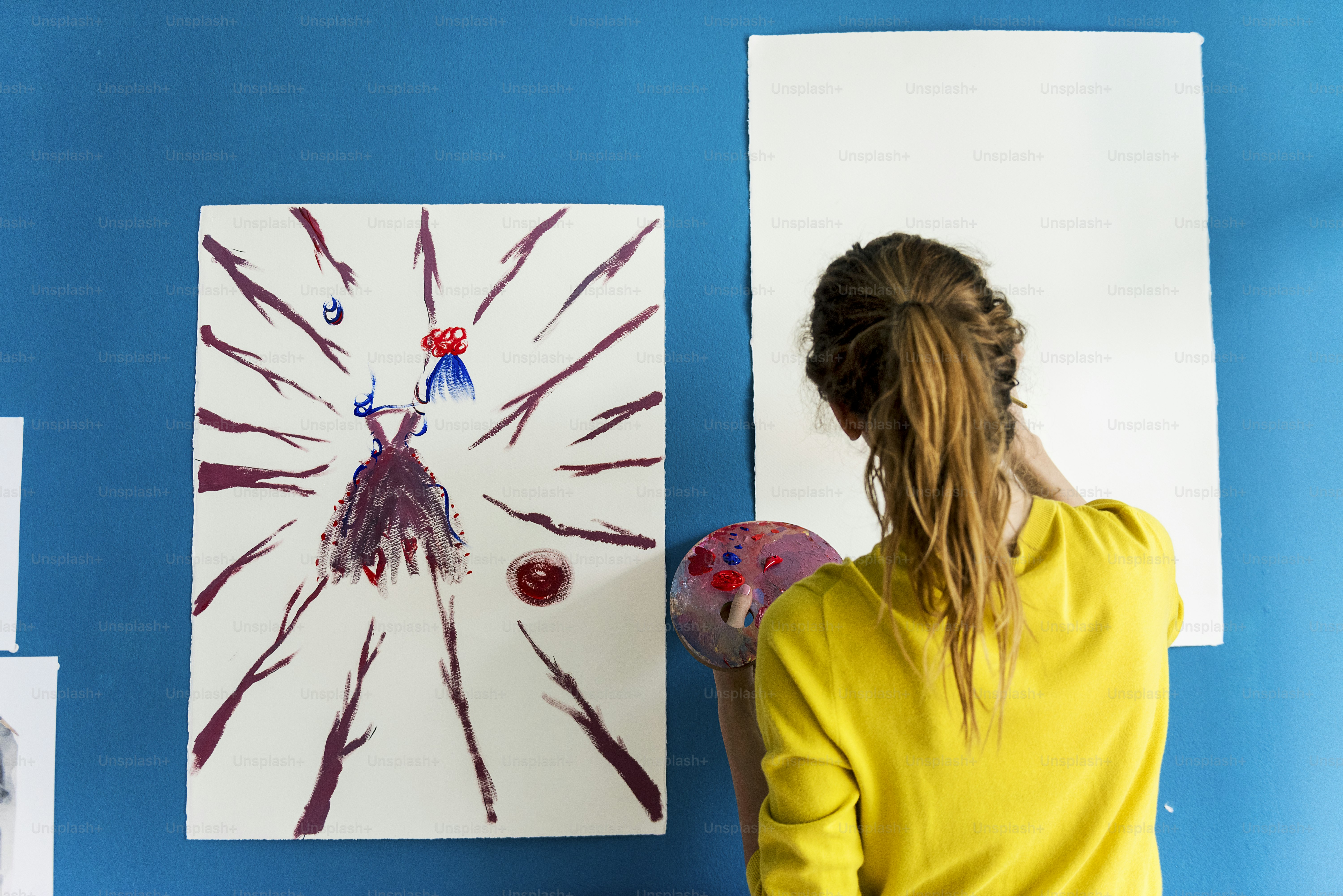 Young artist creating an artwork ***These are our own 3D generic ...