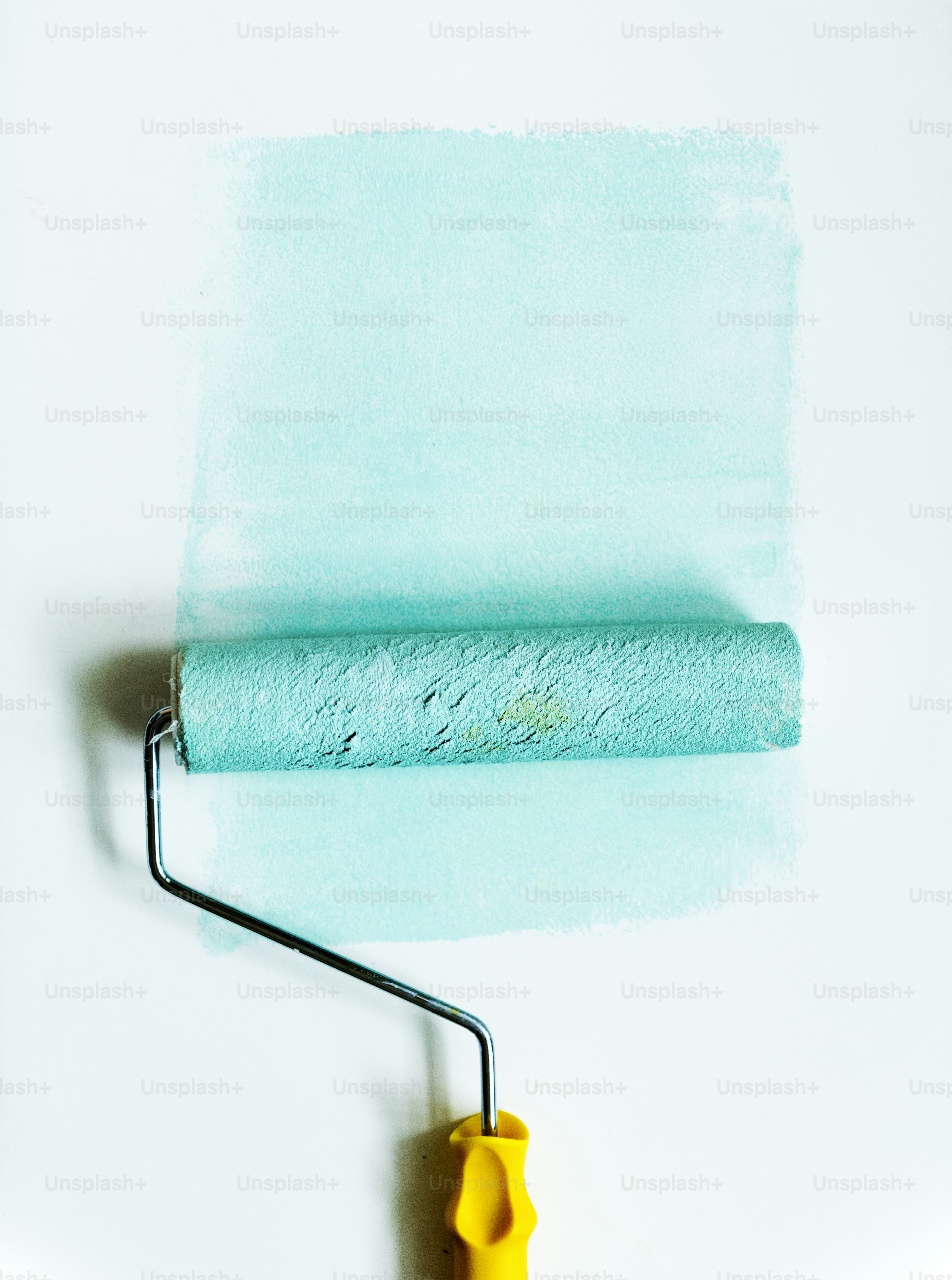 Flat lay of paint roller isolated on white background photo – Flat lay ...