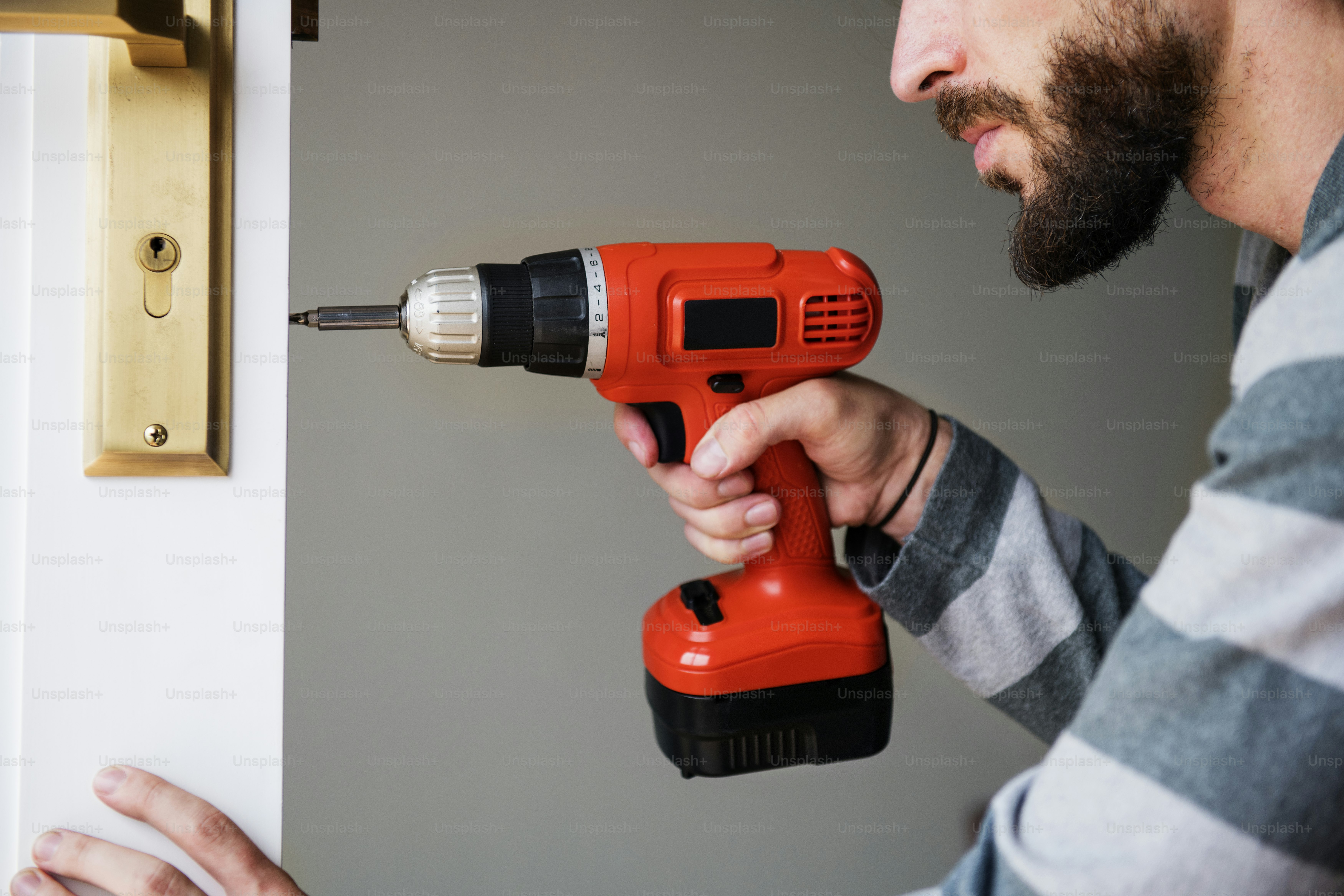 Man using electronic drill install door photo – Adult Image on Unsplash