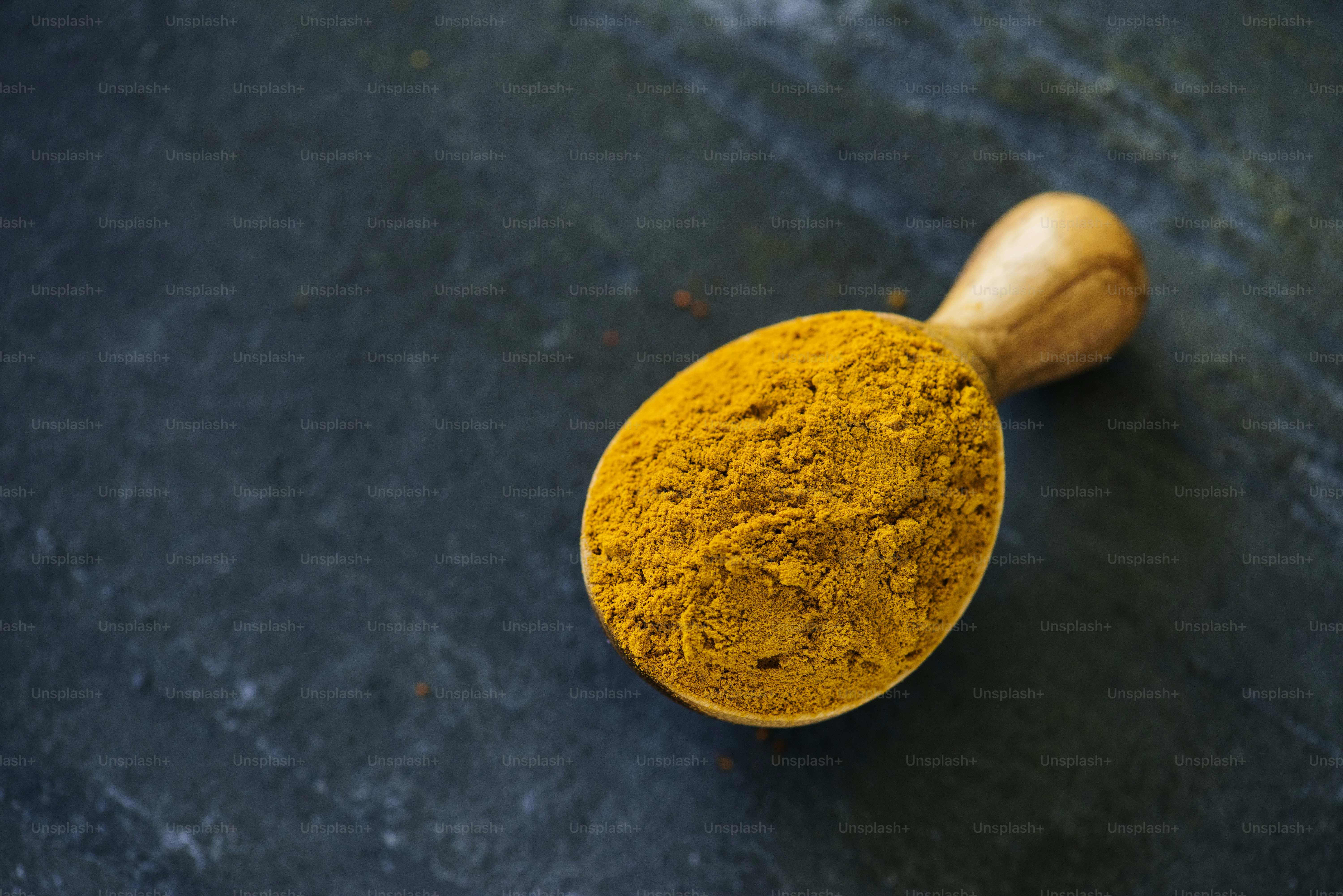 Close up of turmeric powder photo – Macrophotography Image on Unsplash