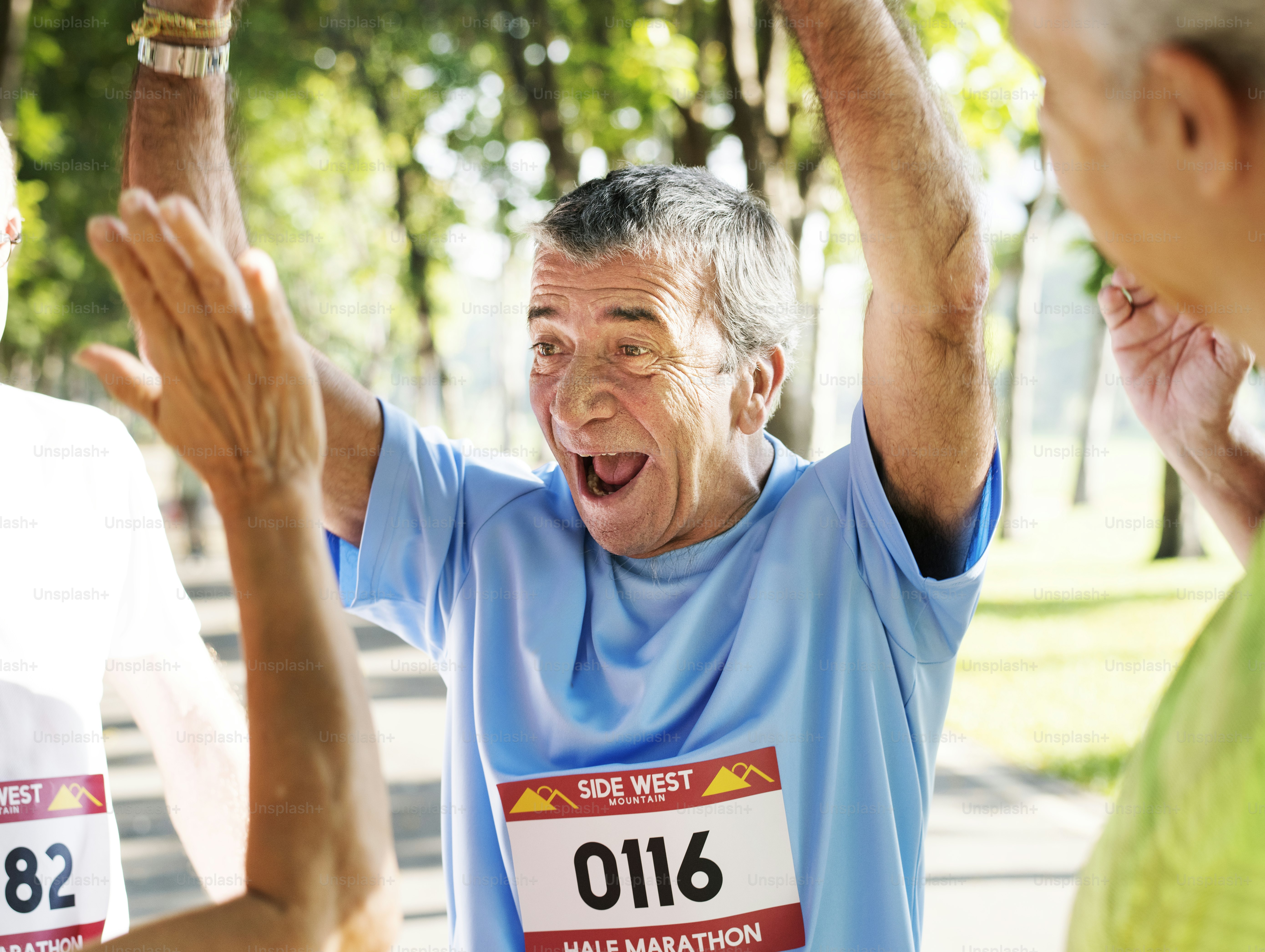 Group of cheerful senior runners at the park photo – Horizontal Image ...