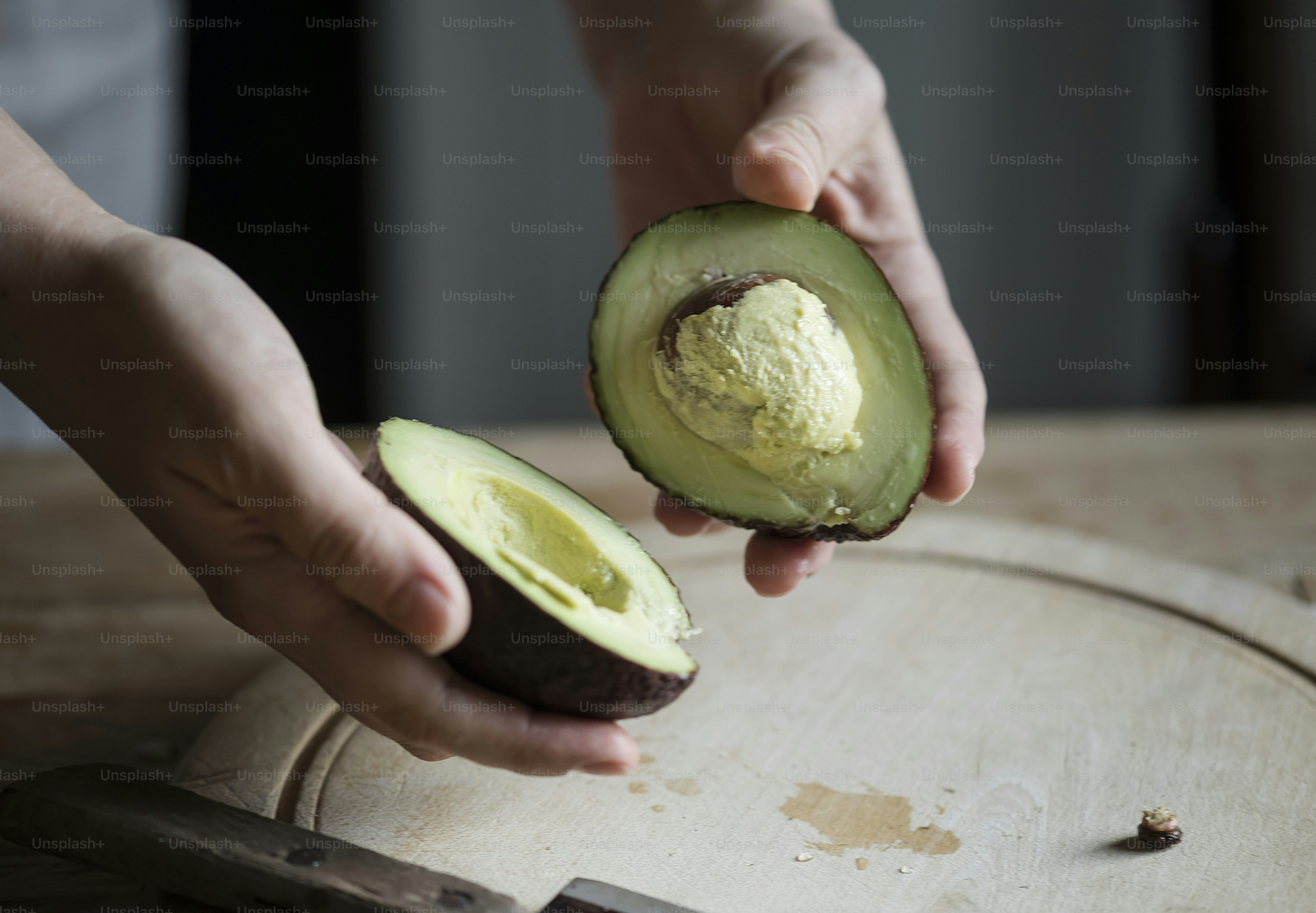 Organic avocado cut into halves food photography recipe idea photo ...
