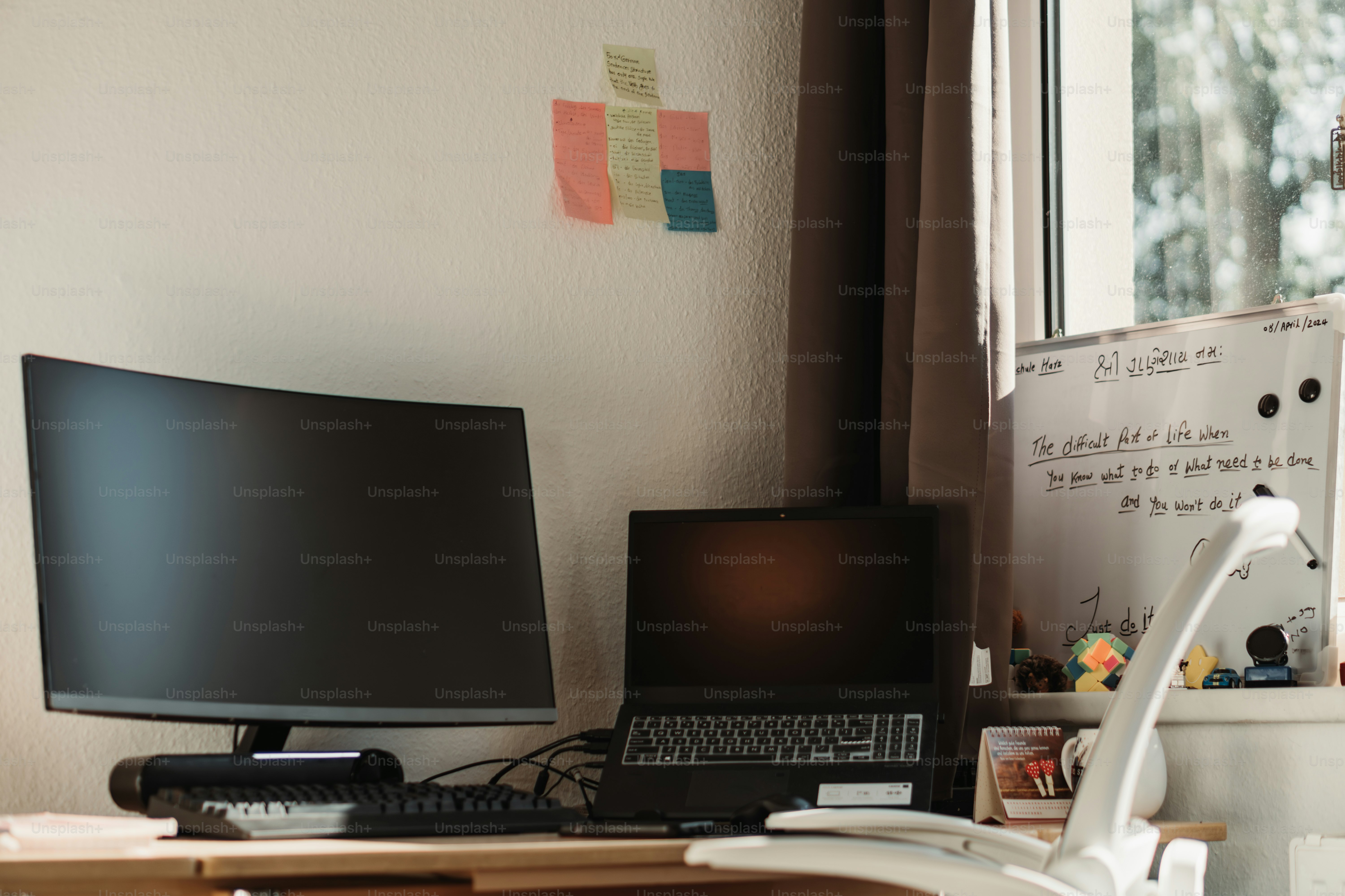 A desk with a computer monitor, keyboard and mouse photo – Student ...