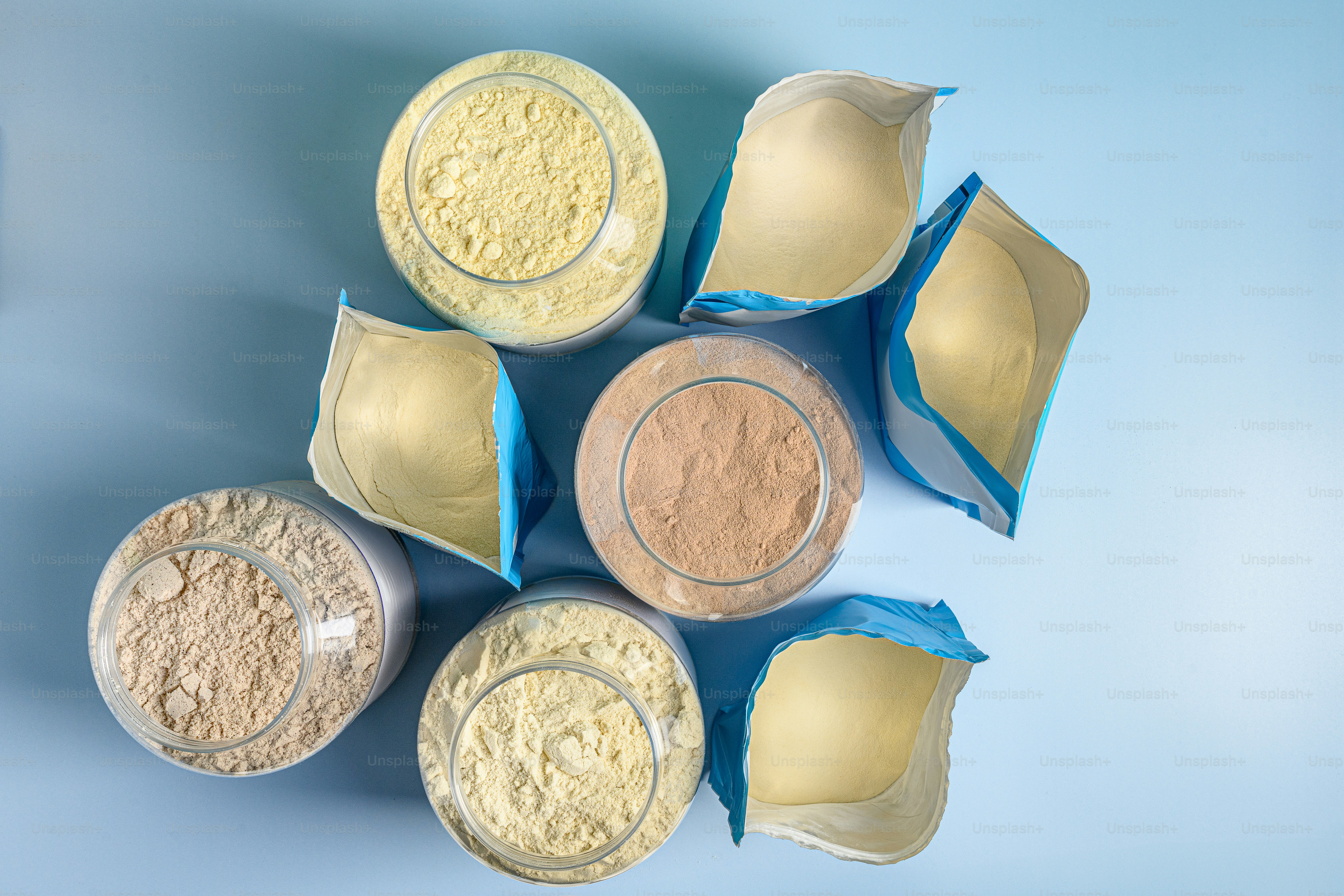 A group of different types of powdered food photo – Protein powder ...