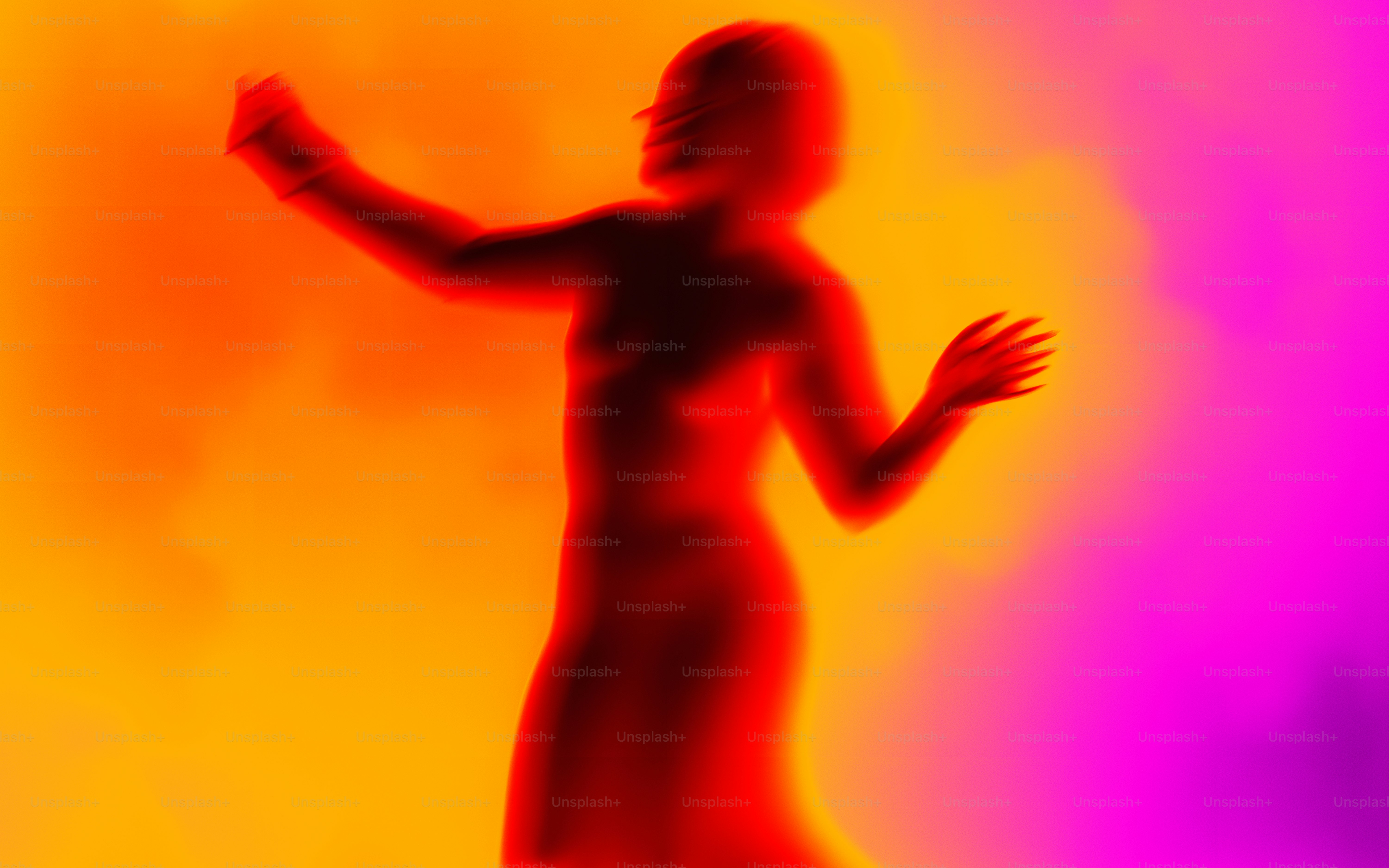 A blurry image of a woman in a dress photo – Heatmap Image on Unsplash