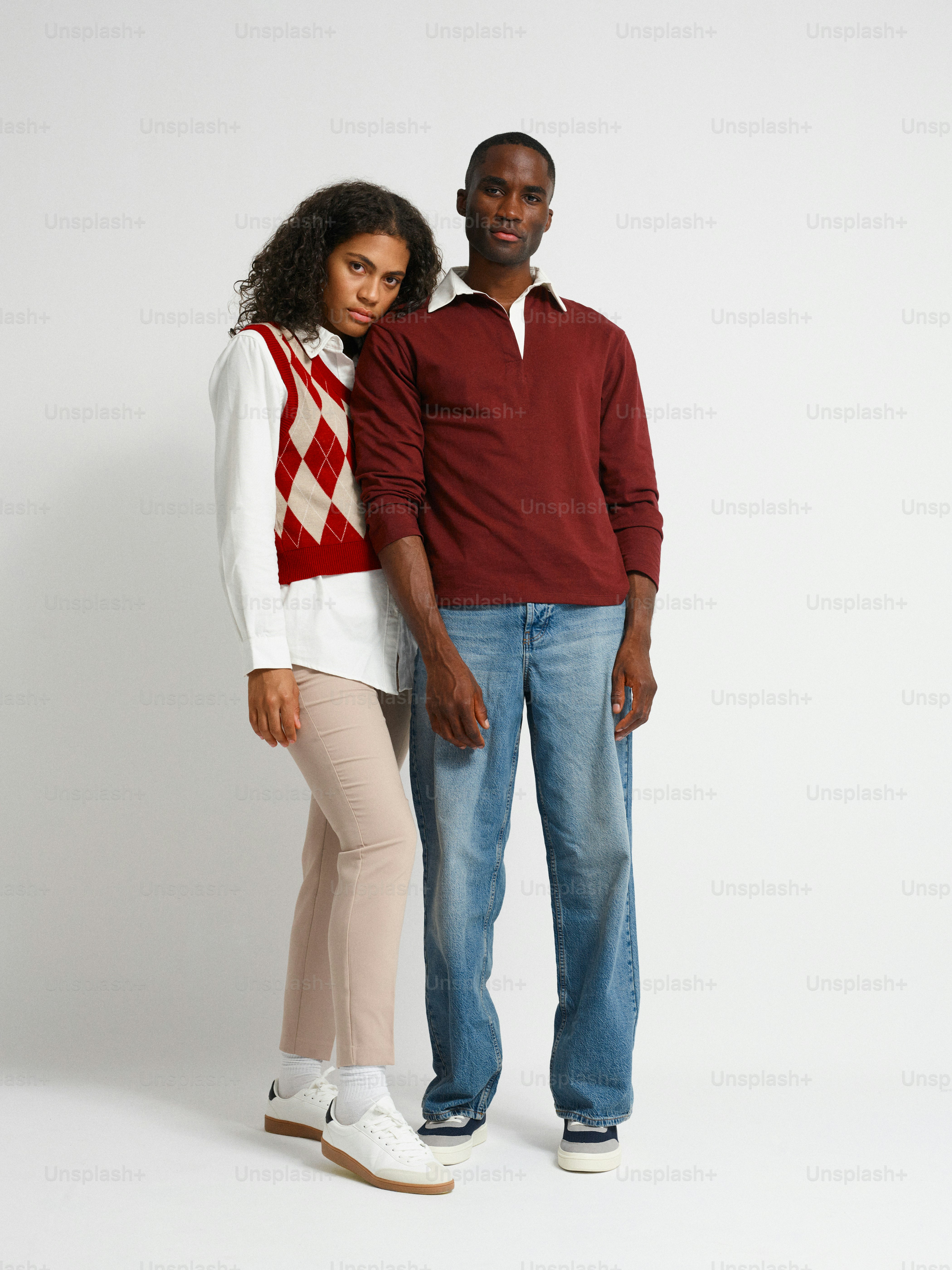A man and a woman standing next to each other photo – Couple Image on ...