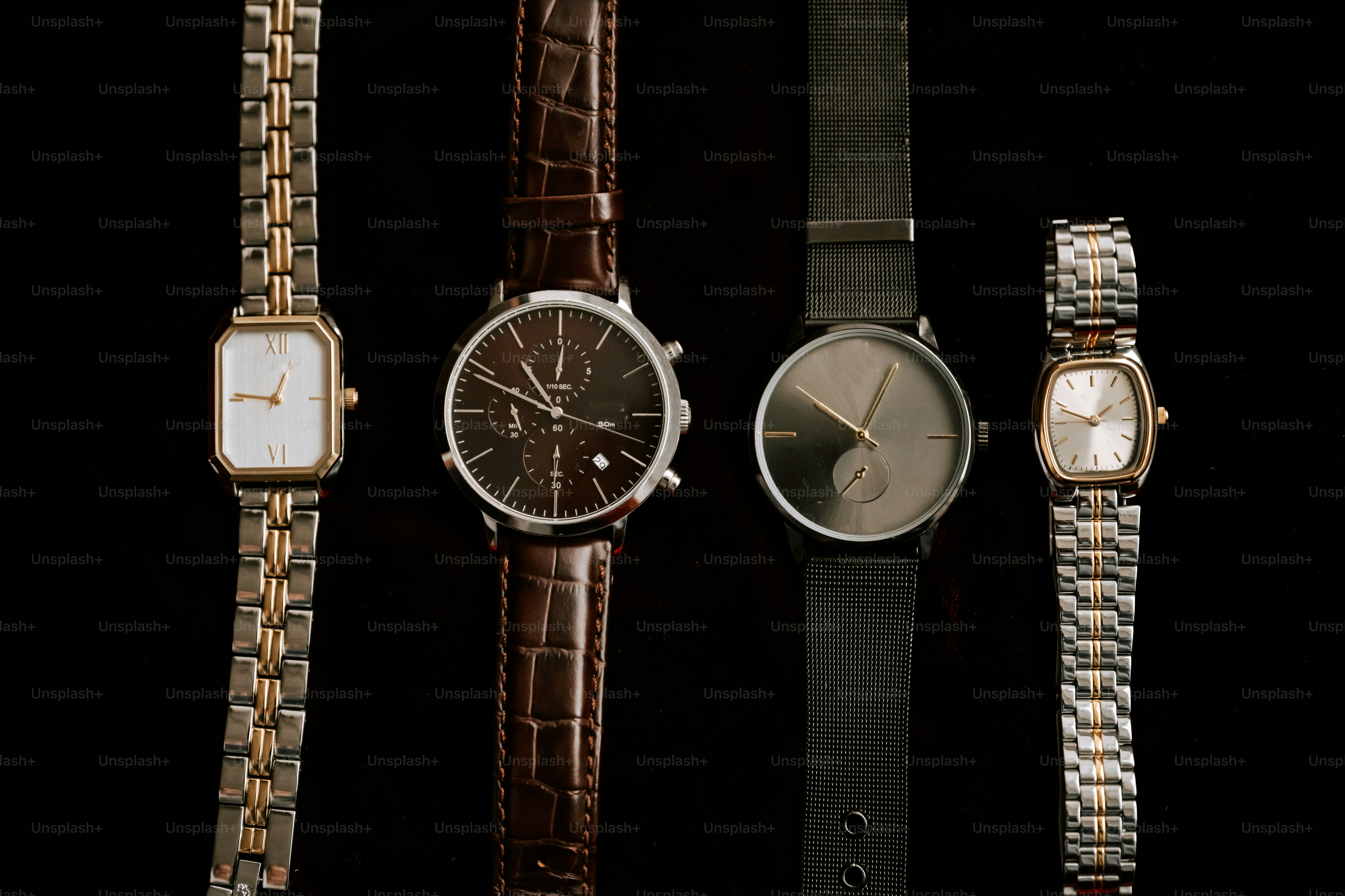 A group of watches sitting next to each other photo – Wristwatch Image ...