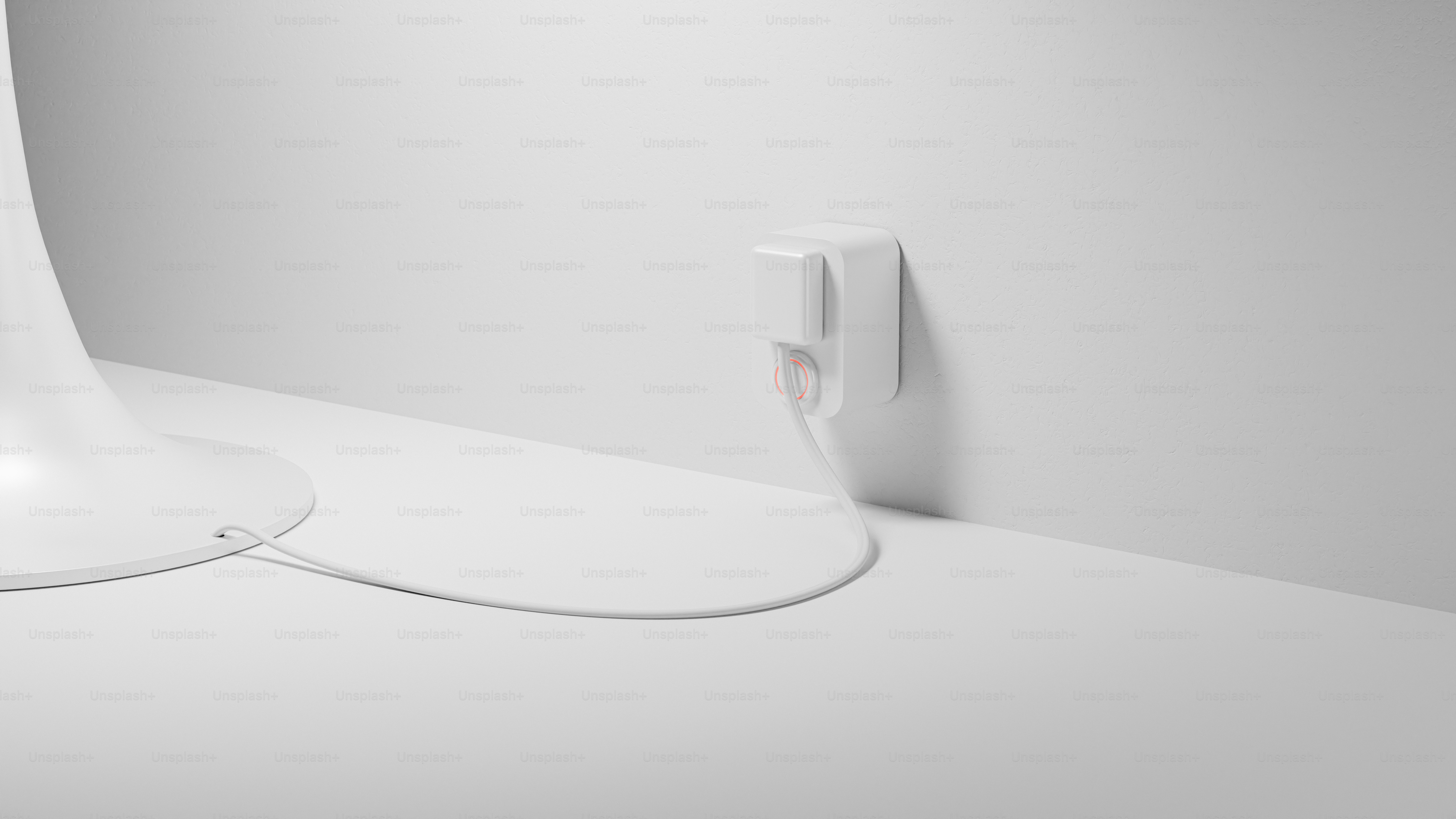 A wii remote sitting on top of a white table photo – Technology Image ...