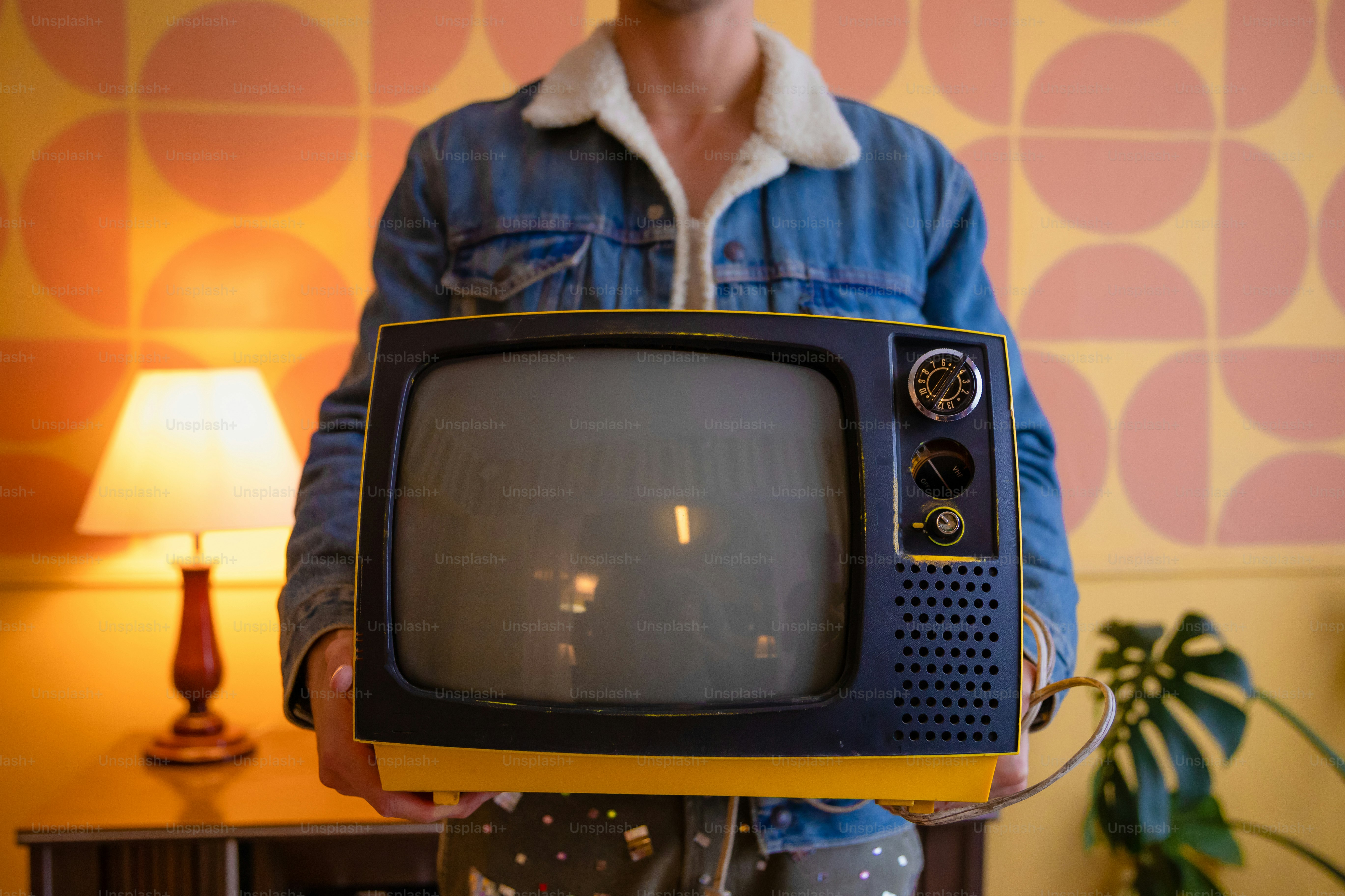 A man standing in front of a green and white checkered bathroom photo ...