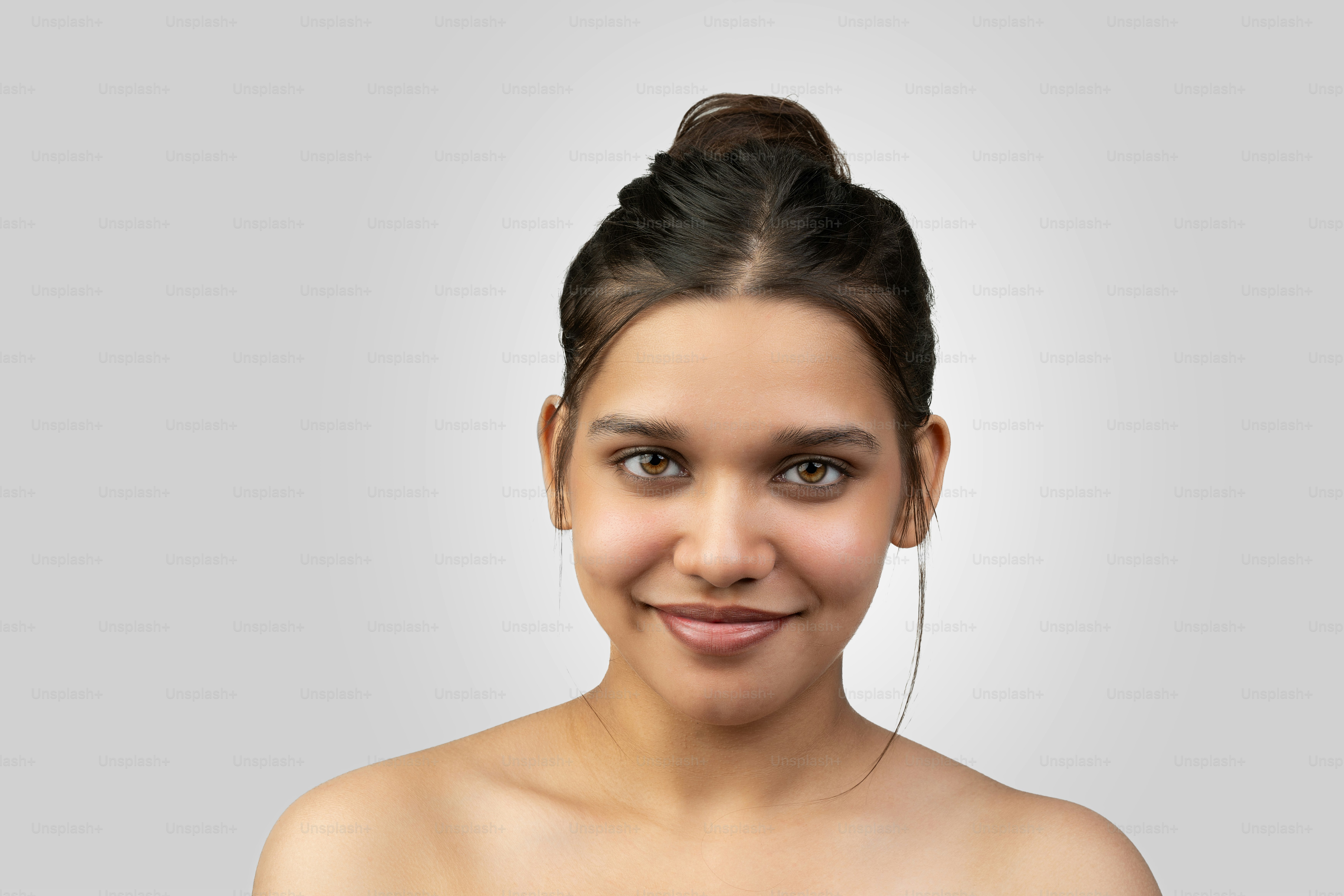 A woman with no shirt on posing for a picture photo – Indian skin Image ...