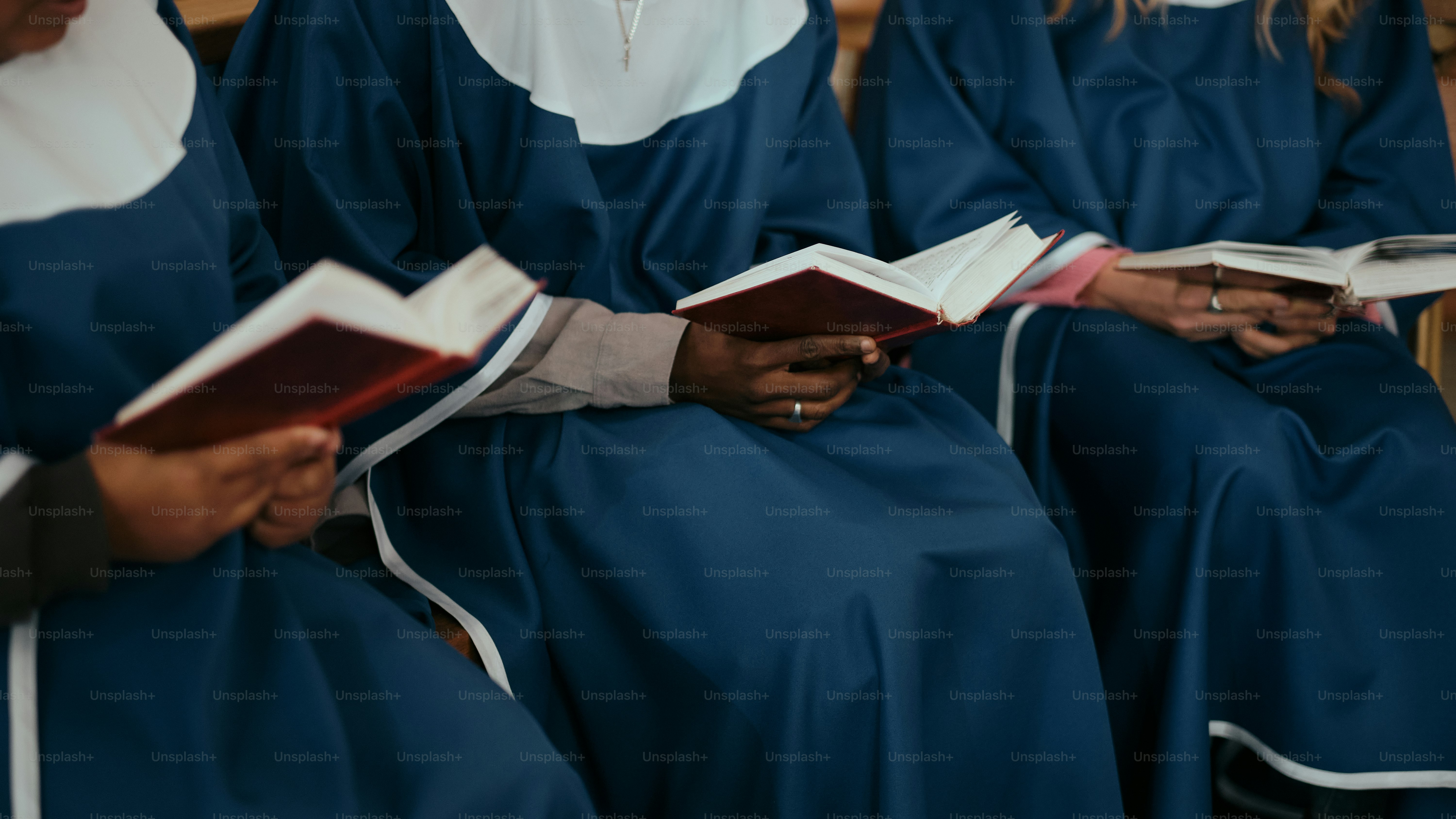 A group of women sitting next to each other photo – Church choir Image ...
