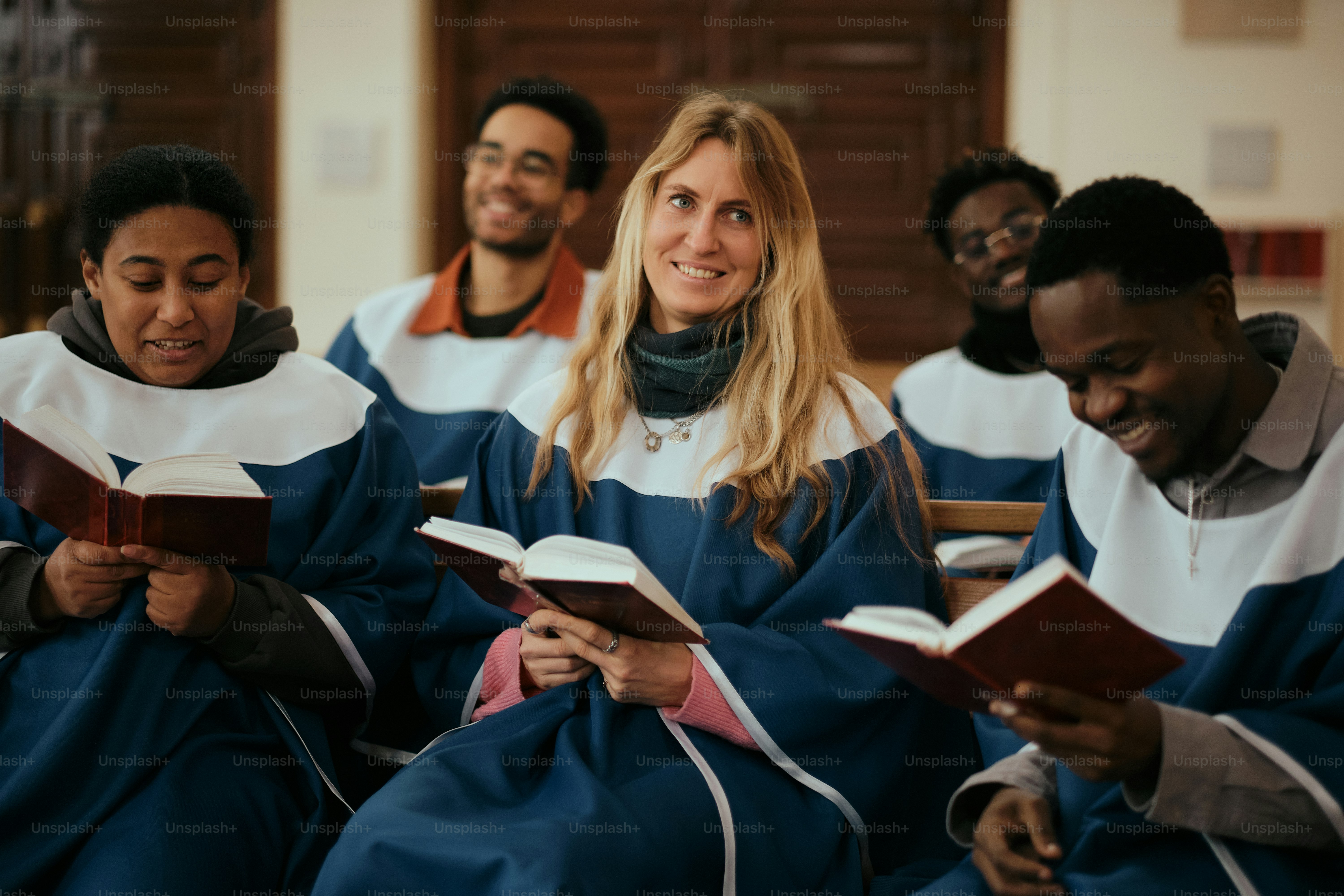 A group of people that are sitting down together photo – Church choir ...