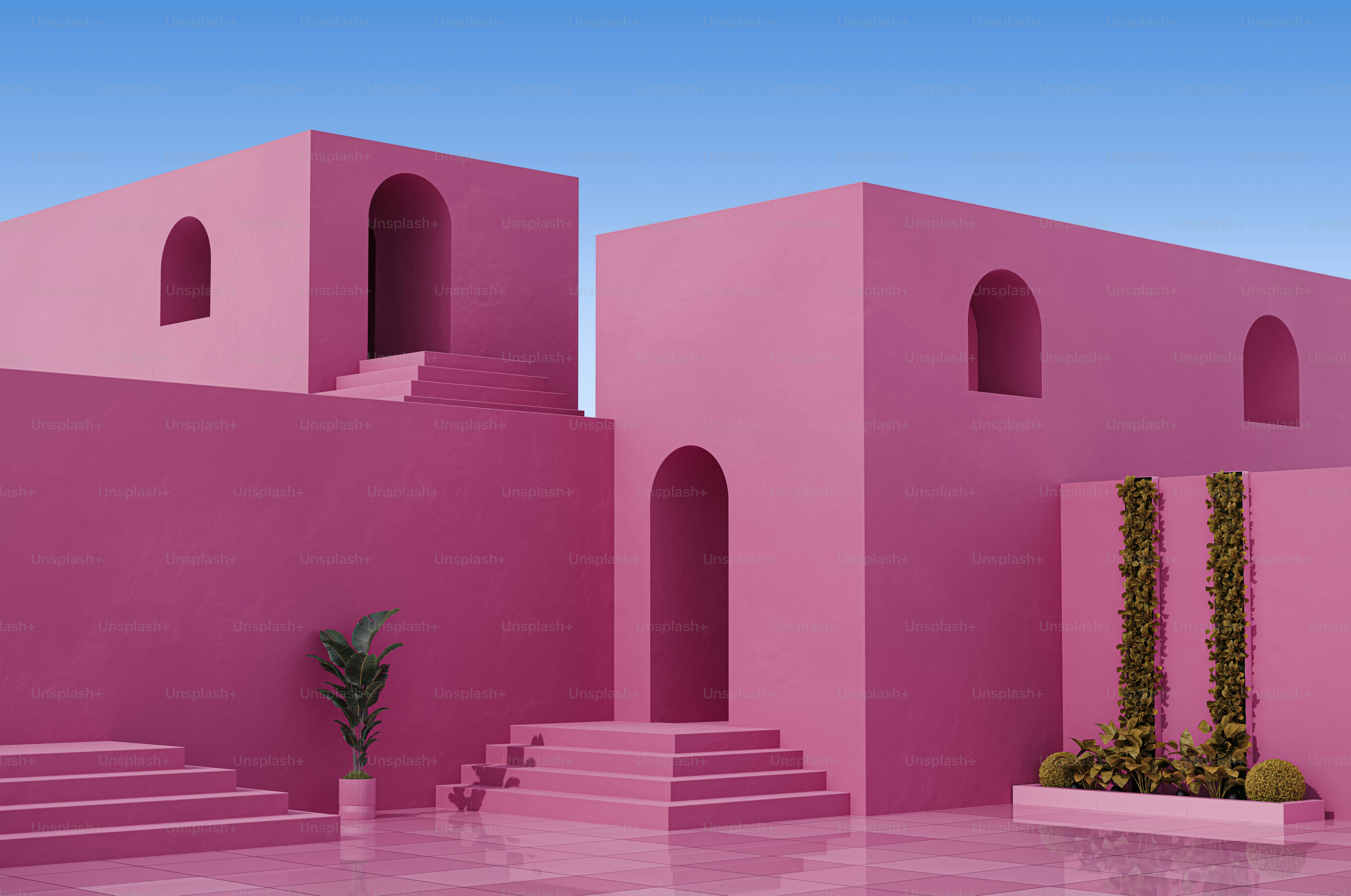 Un edificio rosa con escalones y una planta foto – Imagen de Estructura colorida en Unsplash