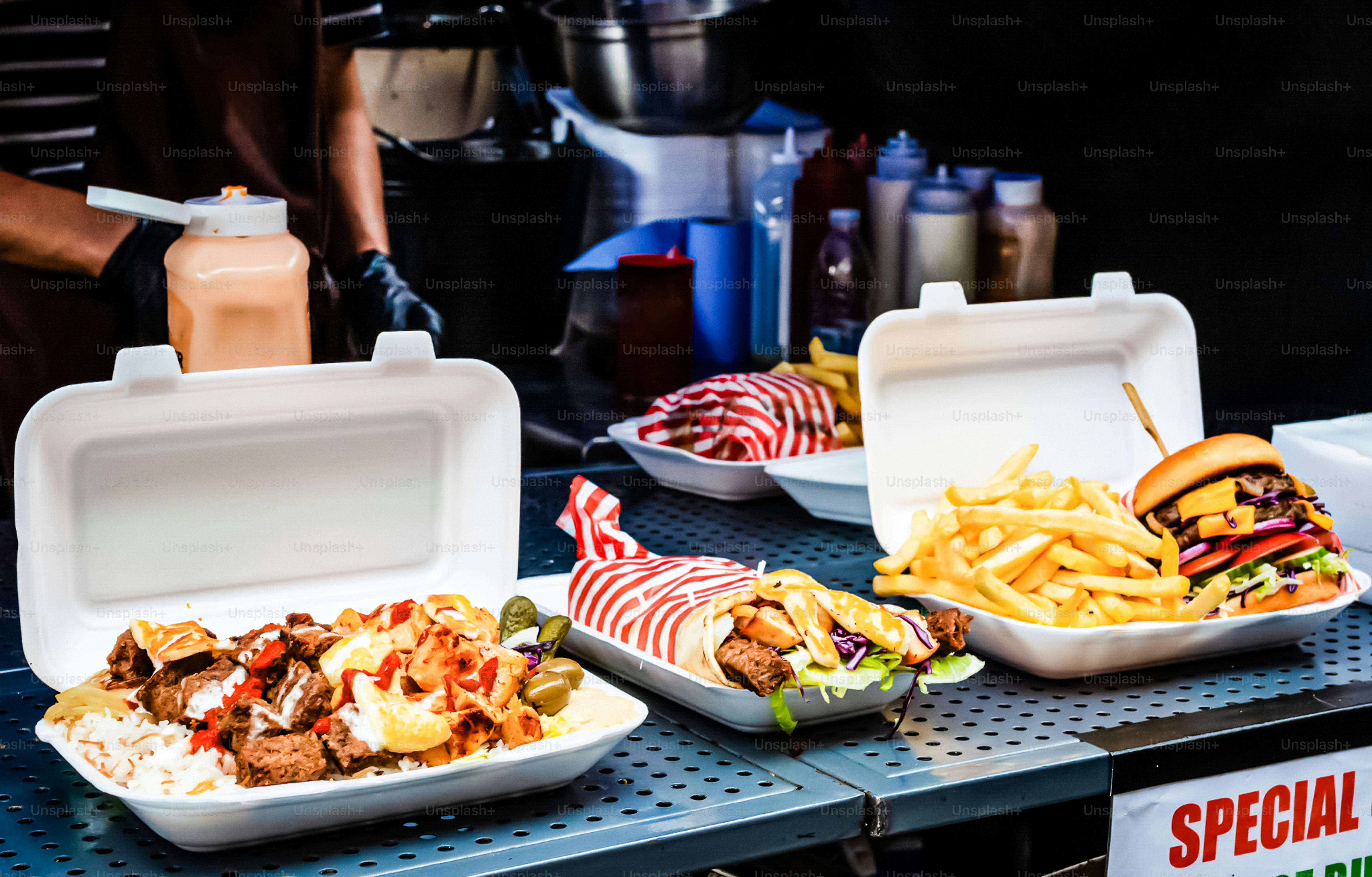 A table that has some food on it photo – Fast food Image on Unsplash