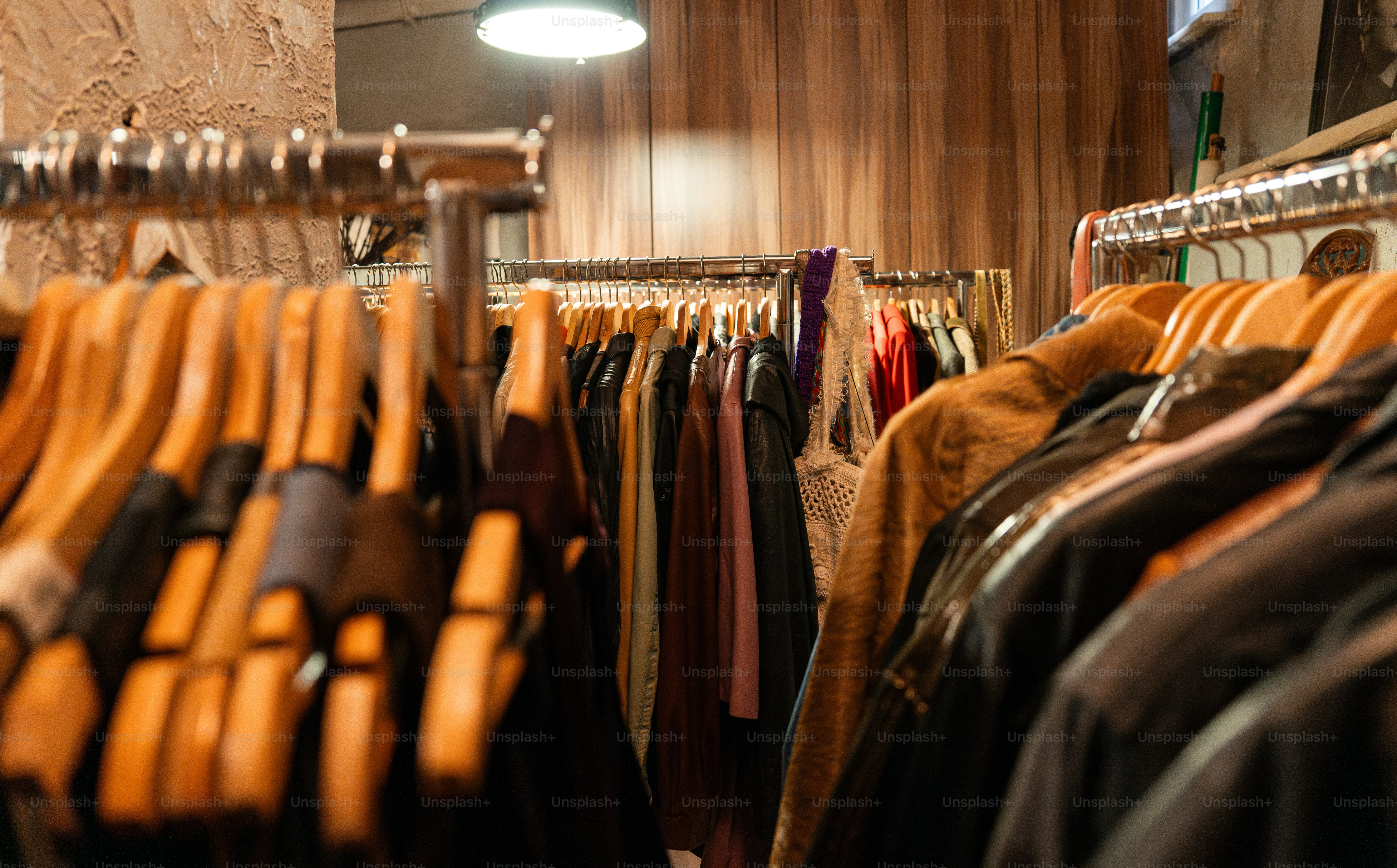 A rack of clothes in a clothing store photo – Thrifting Image on Unsplash