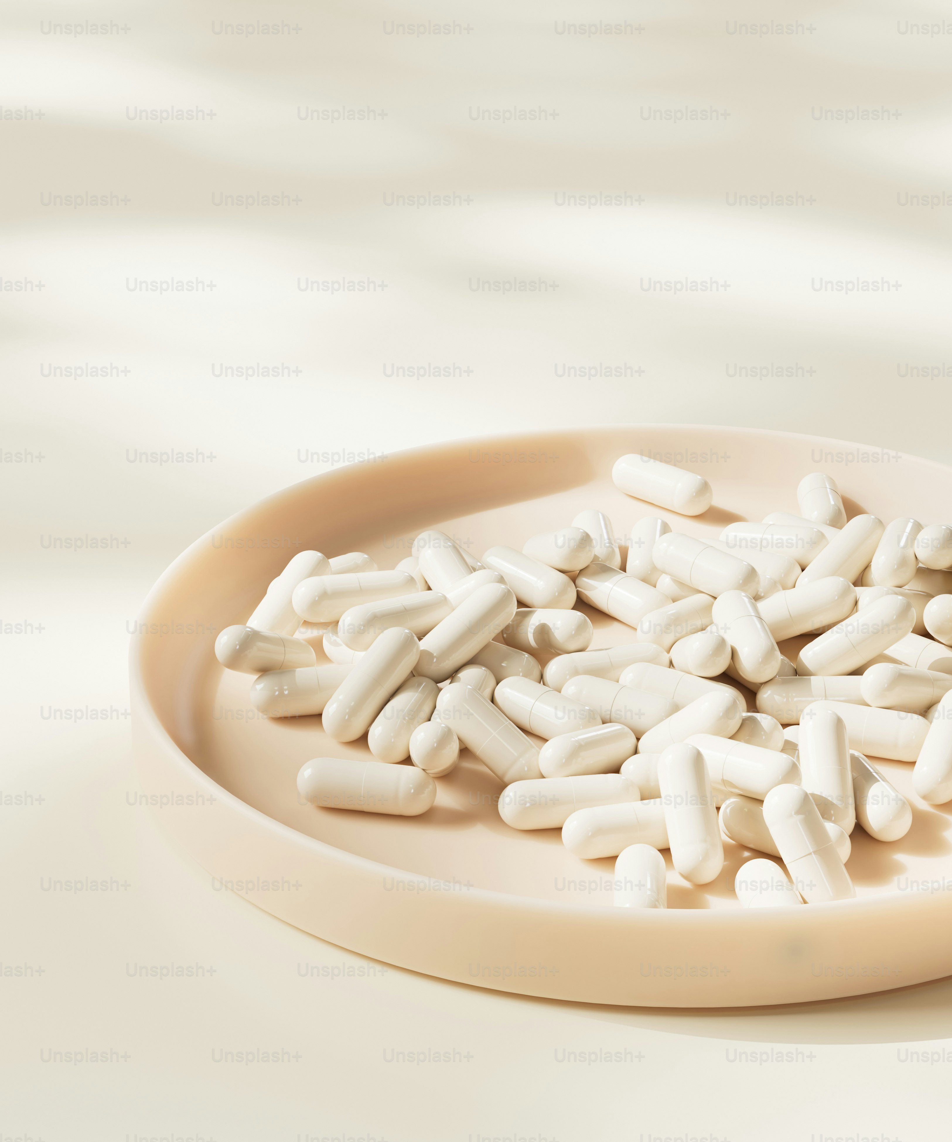 A spoon full of white pills sitting on a table photo – Wellness Image ...