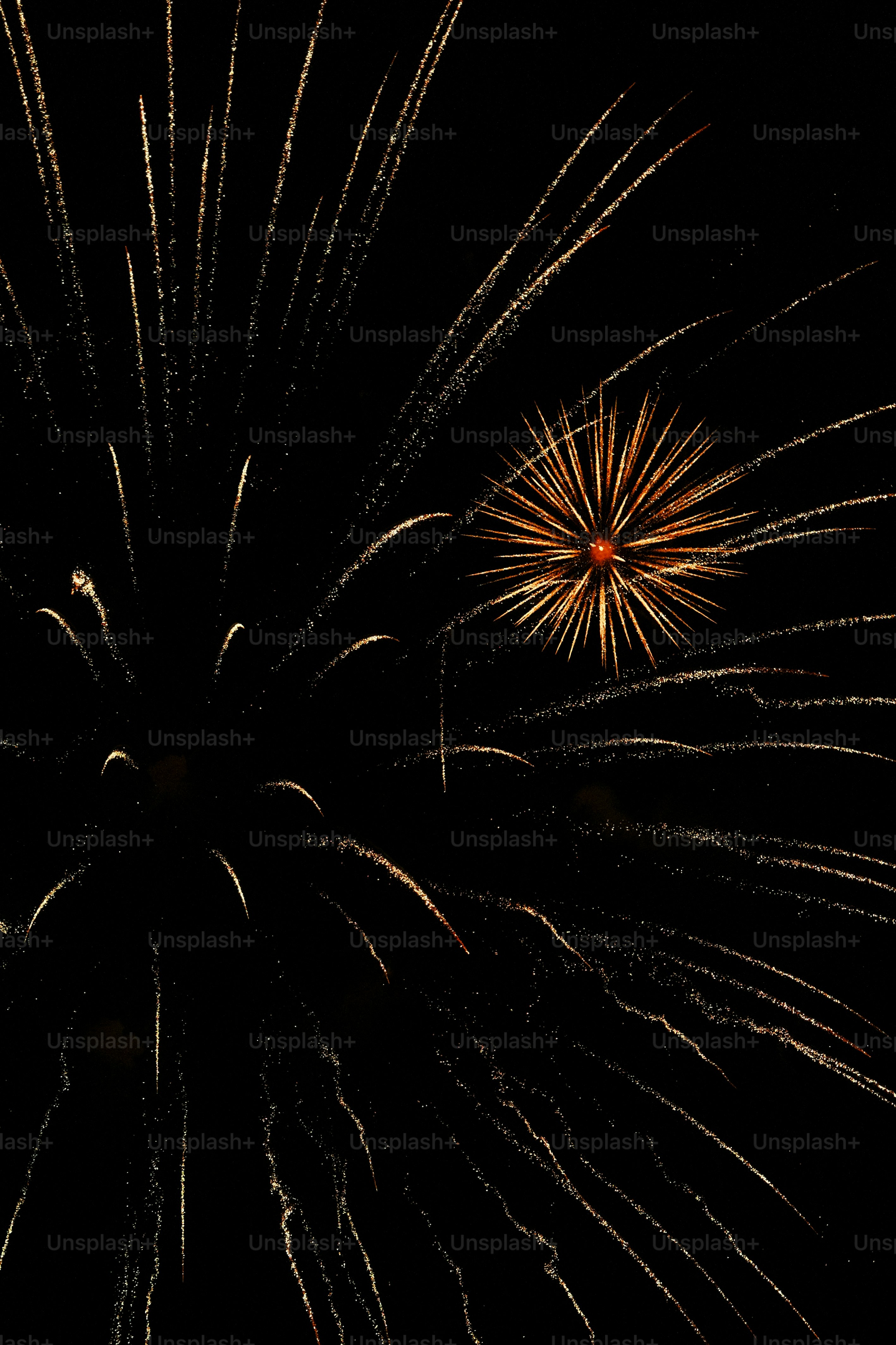 A black background with a bunch of fireworks photo – Fireworks Image on ...