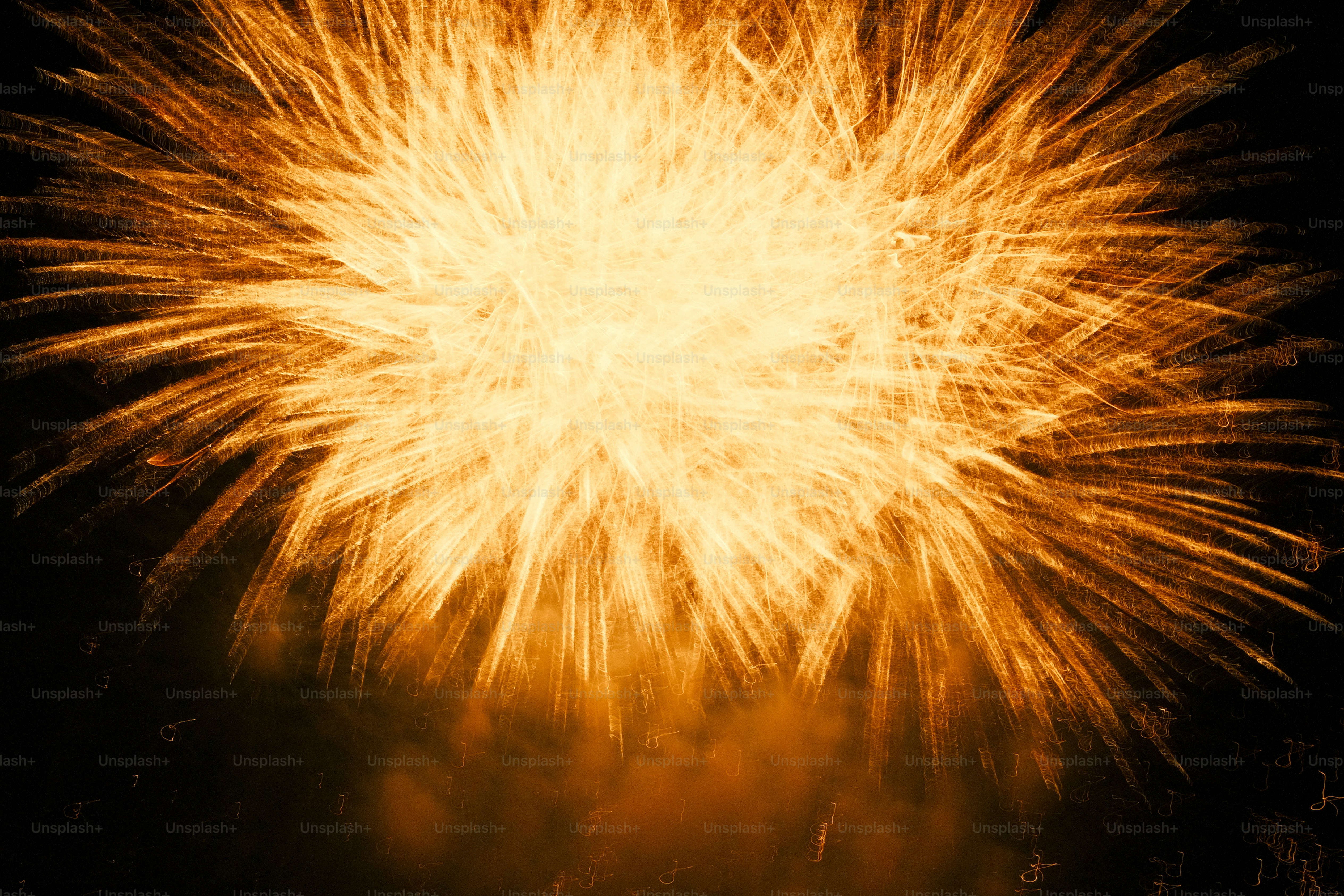 A firework display in the night sky photo – Fireworks Image on Unsplash