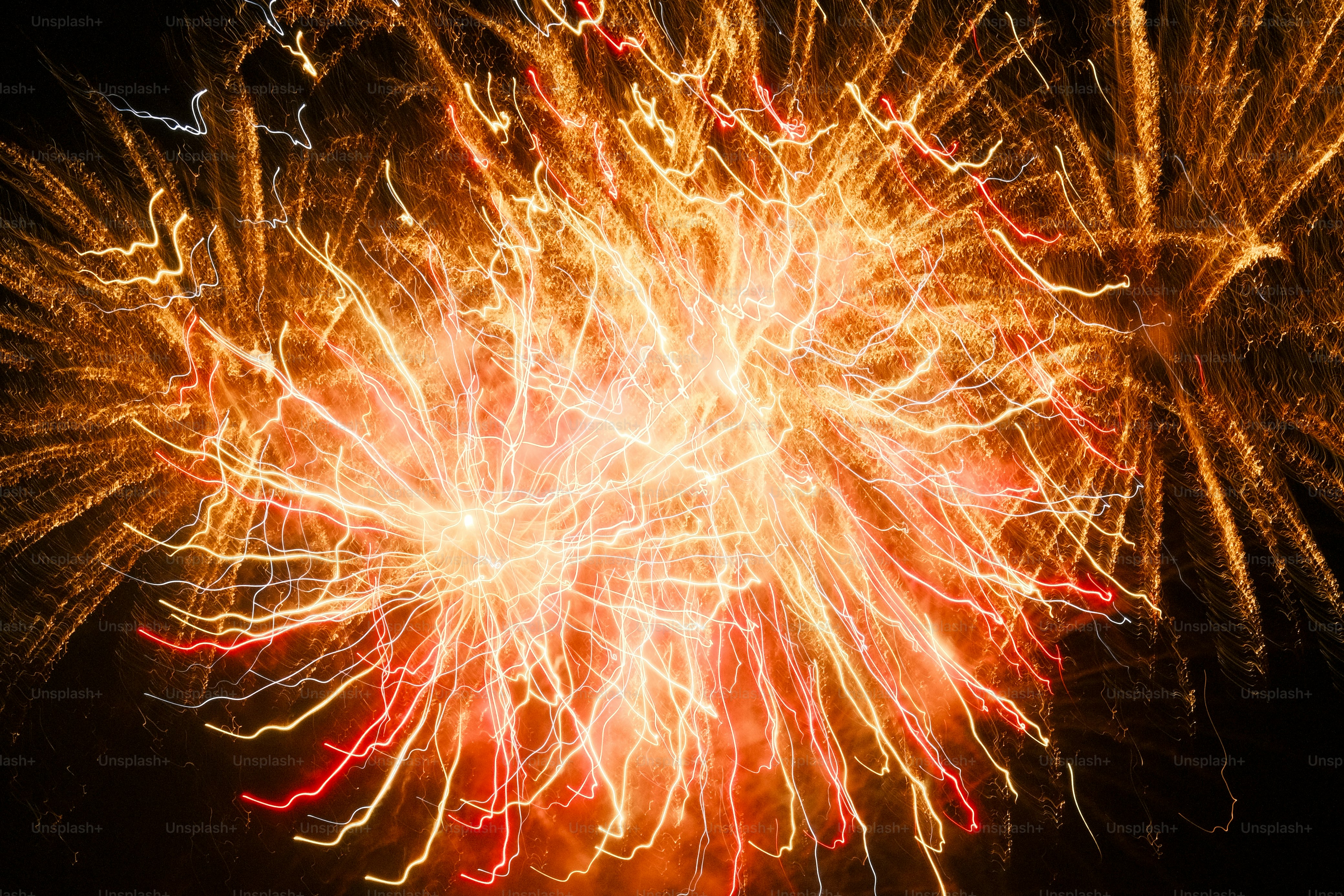 A firework display in the night sky photo – Fireworks Image on Unsplash