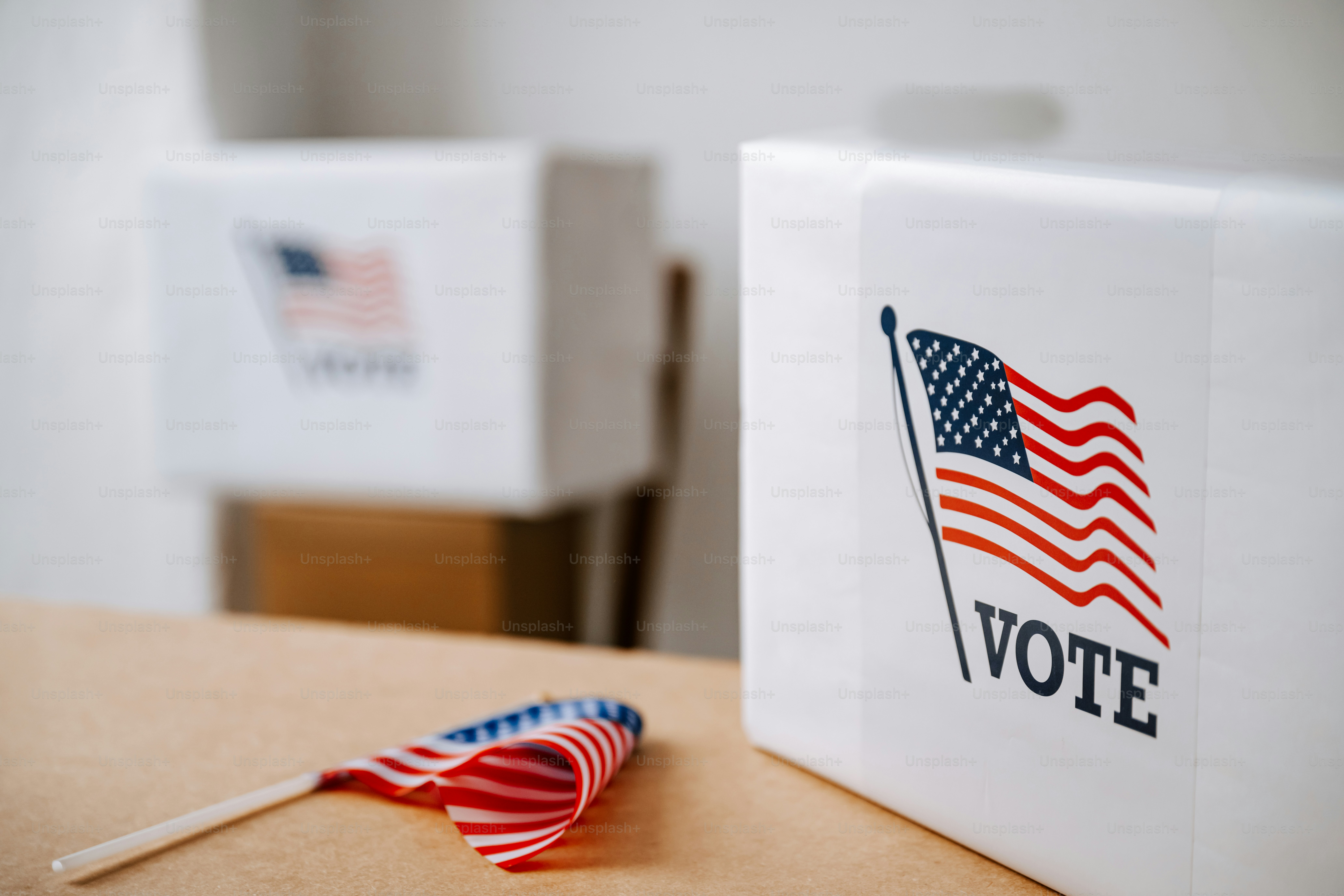A voting box with an american flag on it photo – United states Image on ...