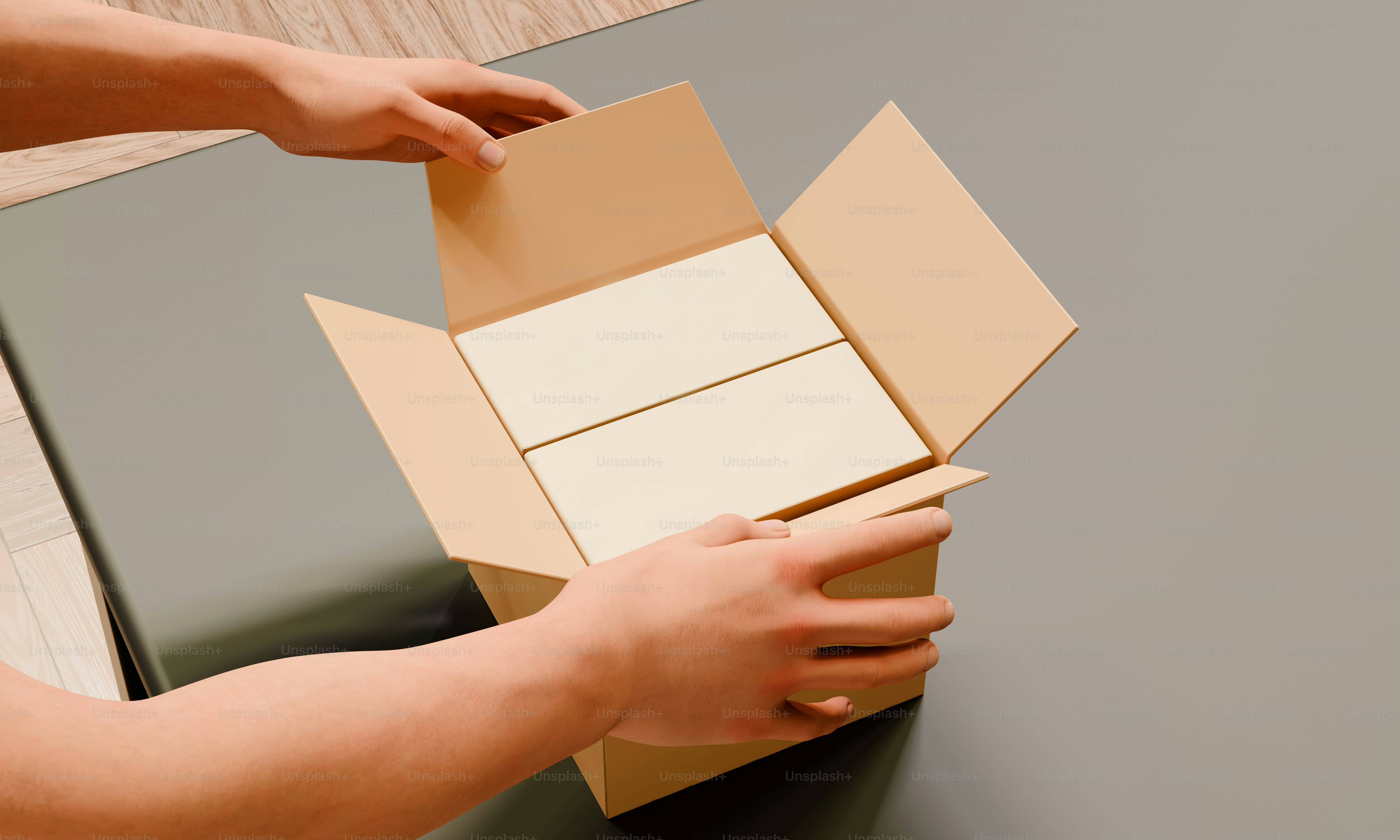 A person unpacking a box on top of a bed photo – Package Image on Unsplash