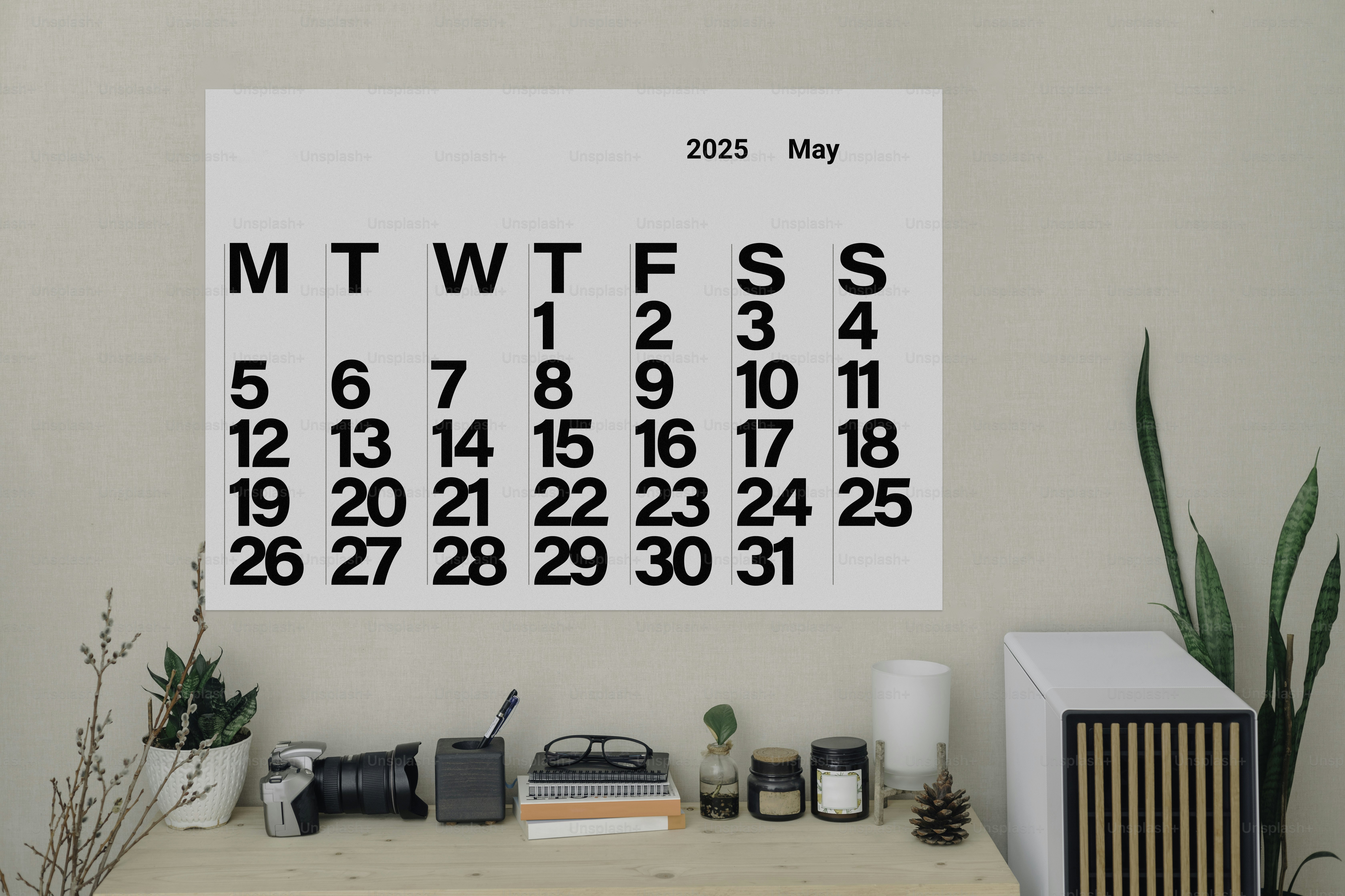 A desk with a calendar on the wall photo – Calendar on wall Image on ...