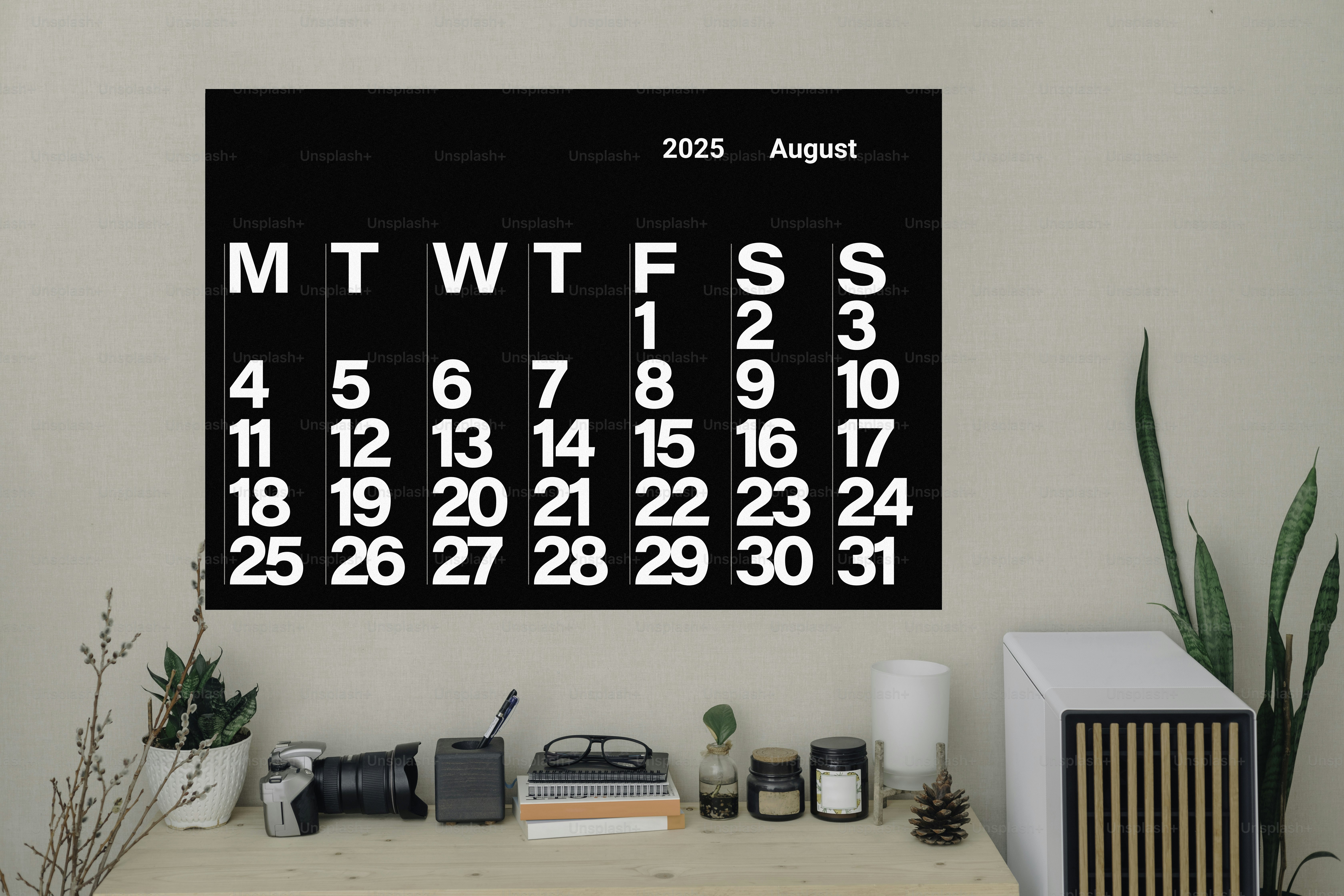 A black and white calendar hanging on a wall photo – Calendar Image on ...