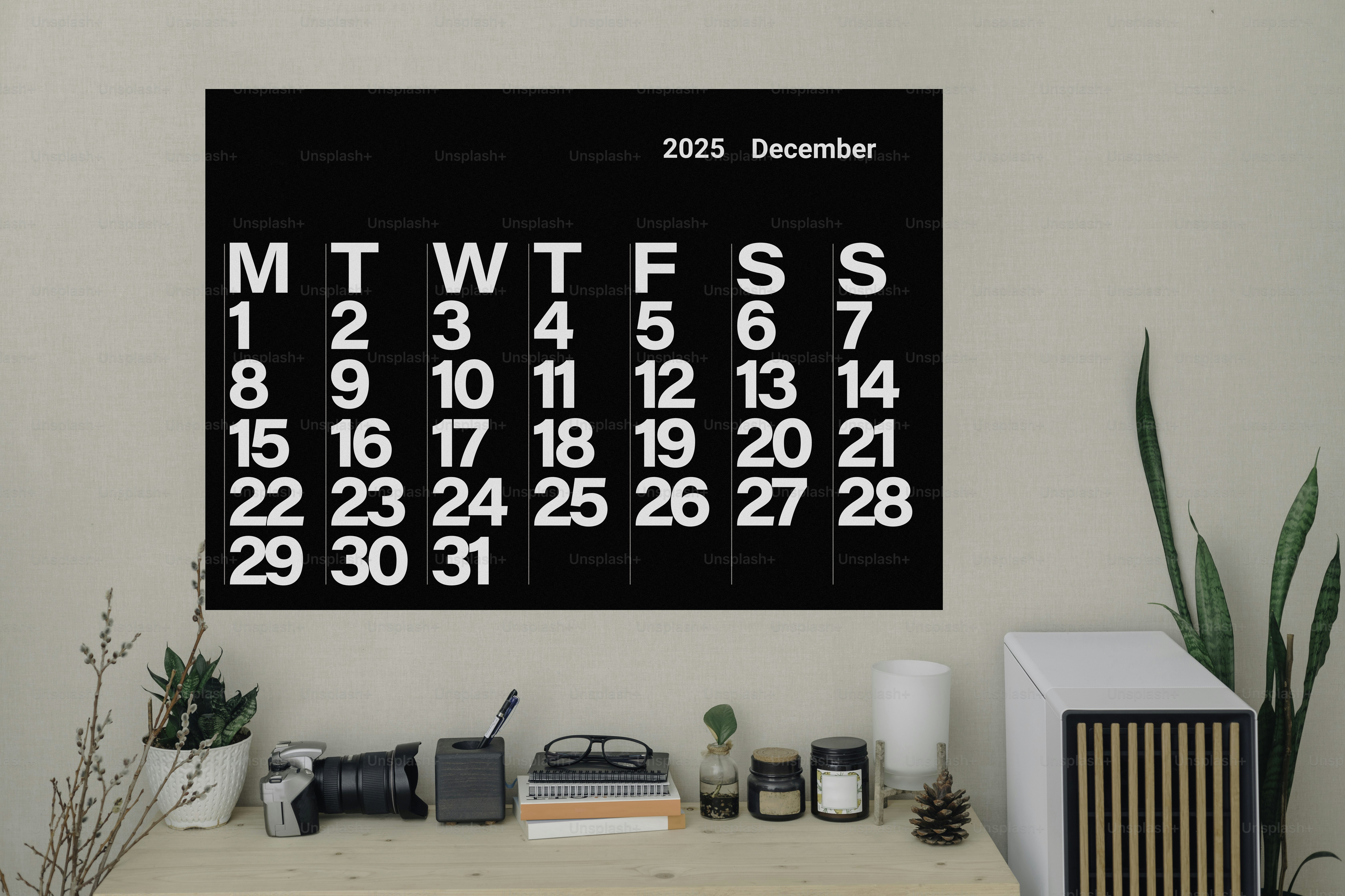 A black and white calendar hanging on a wall photo – Calendar Image on ...