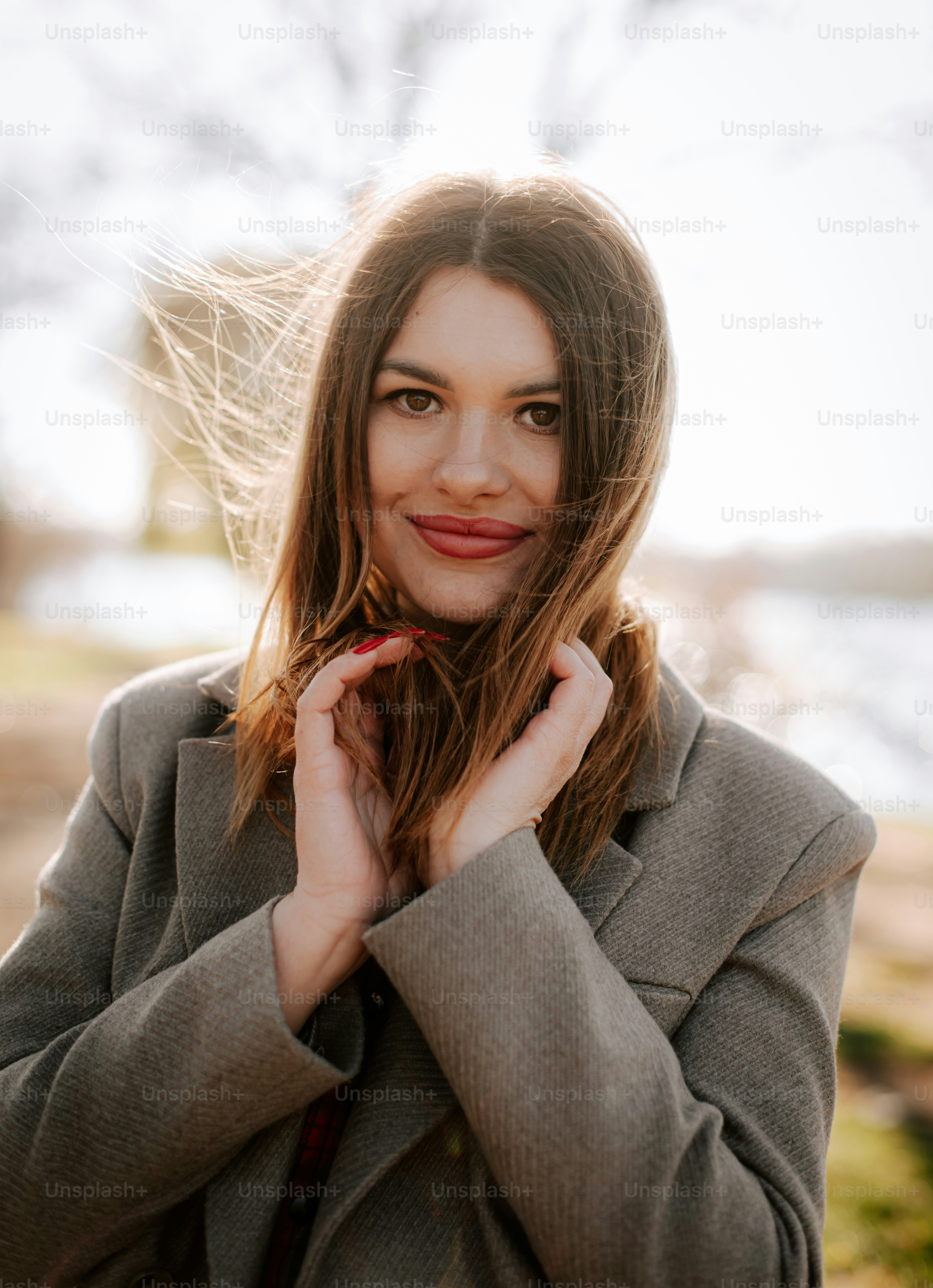 A woman with long hair posing for a picture photo – Profile Image on ...