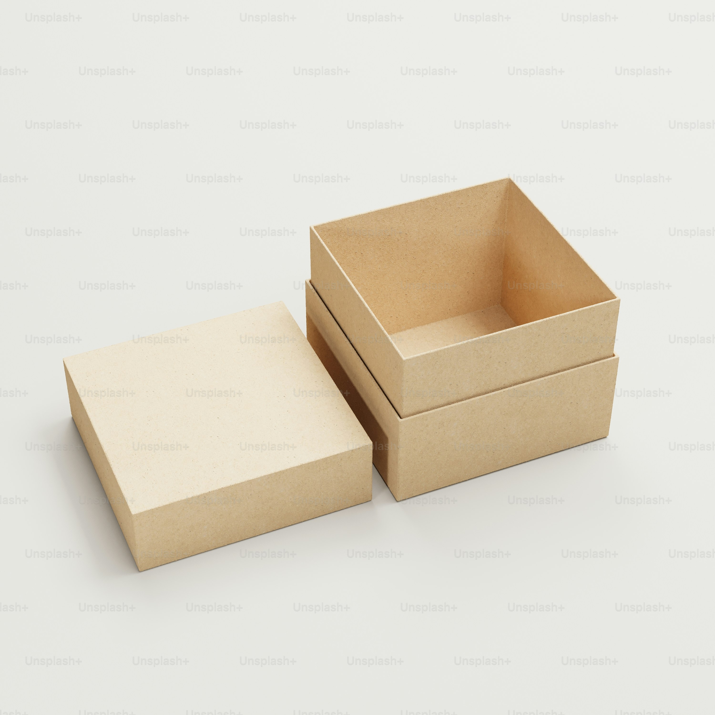 A pair of boxes sitting on top of a table photo – Mockup Image on Unsplash
