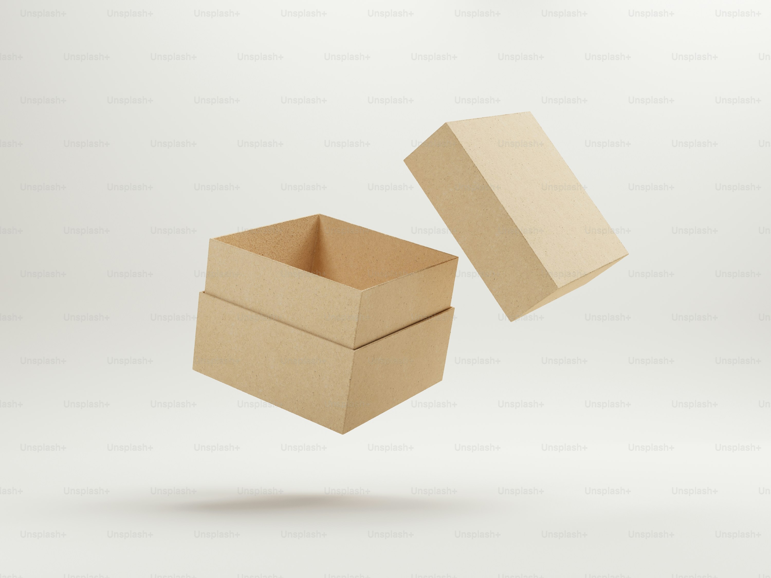 A cardboard box flying through the air photo – Product Image on Unsplash