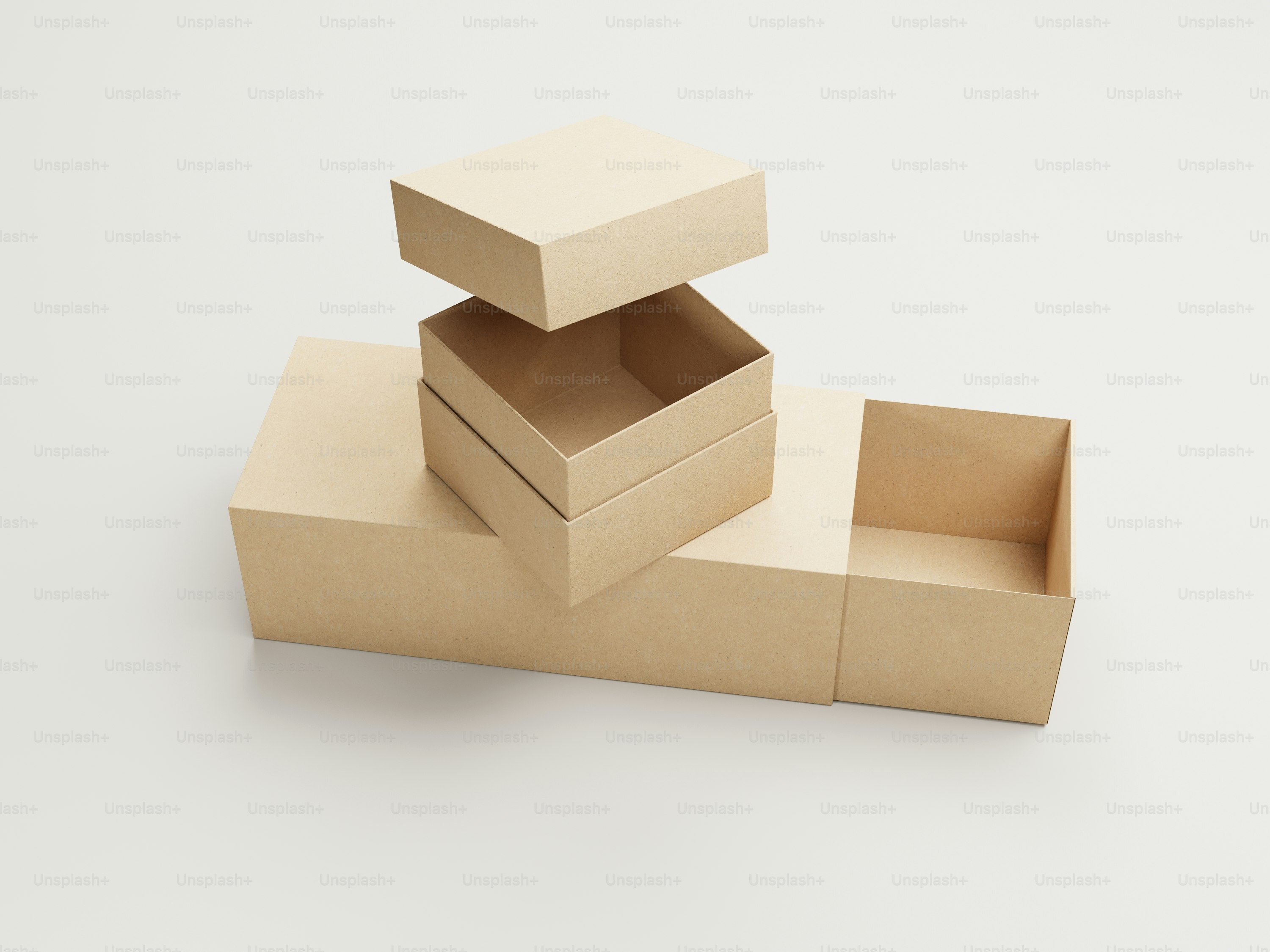 Three cardboard boxes stacked on top of each other photo – Product ...