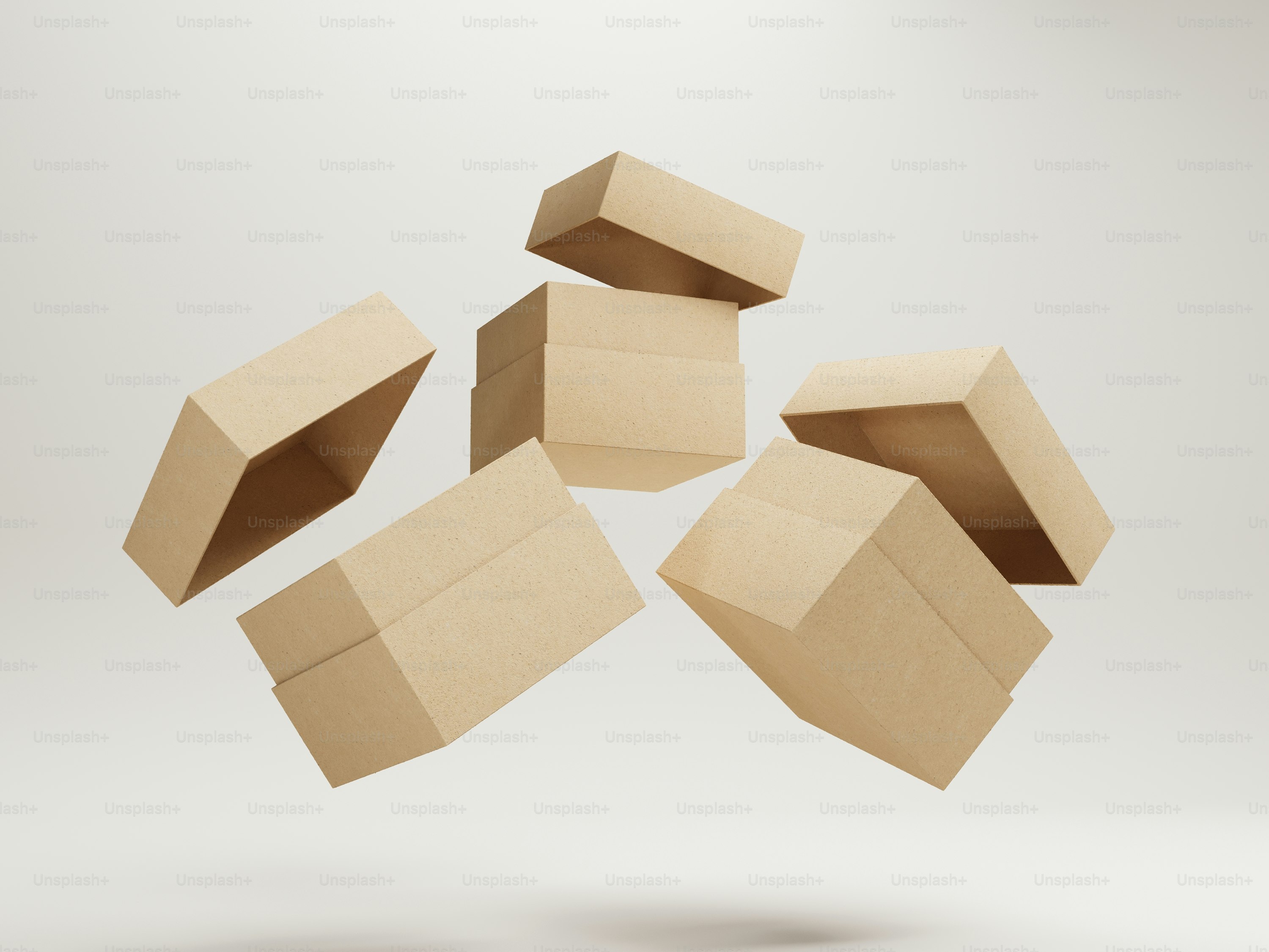 A group of cardboard boxes flying through the air photo – Product Image ...