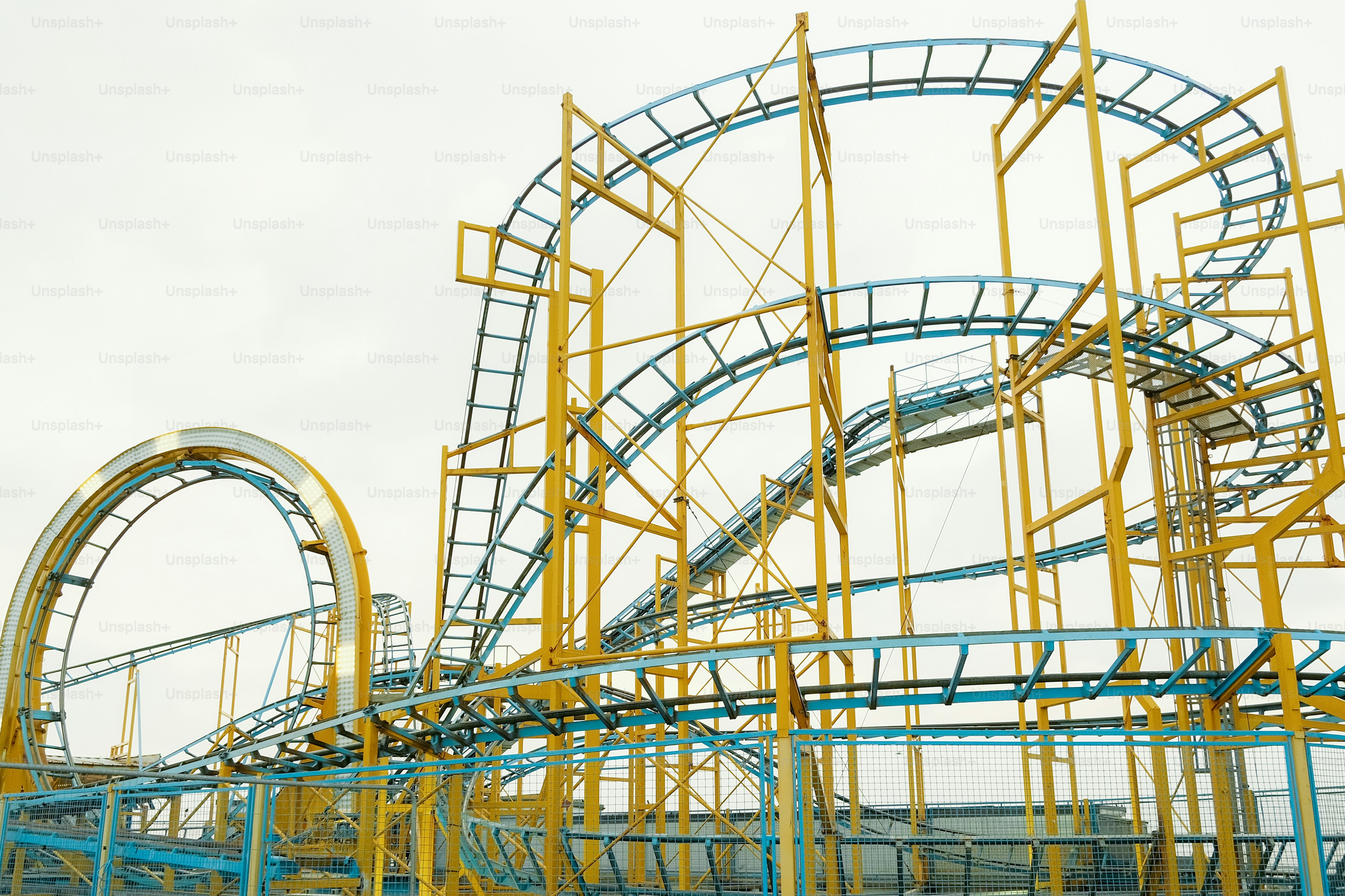 A roller coaster in a roller coaster park photo – Amusement park Image ...