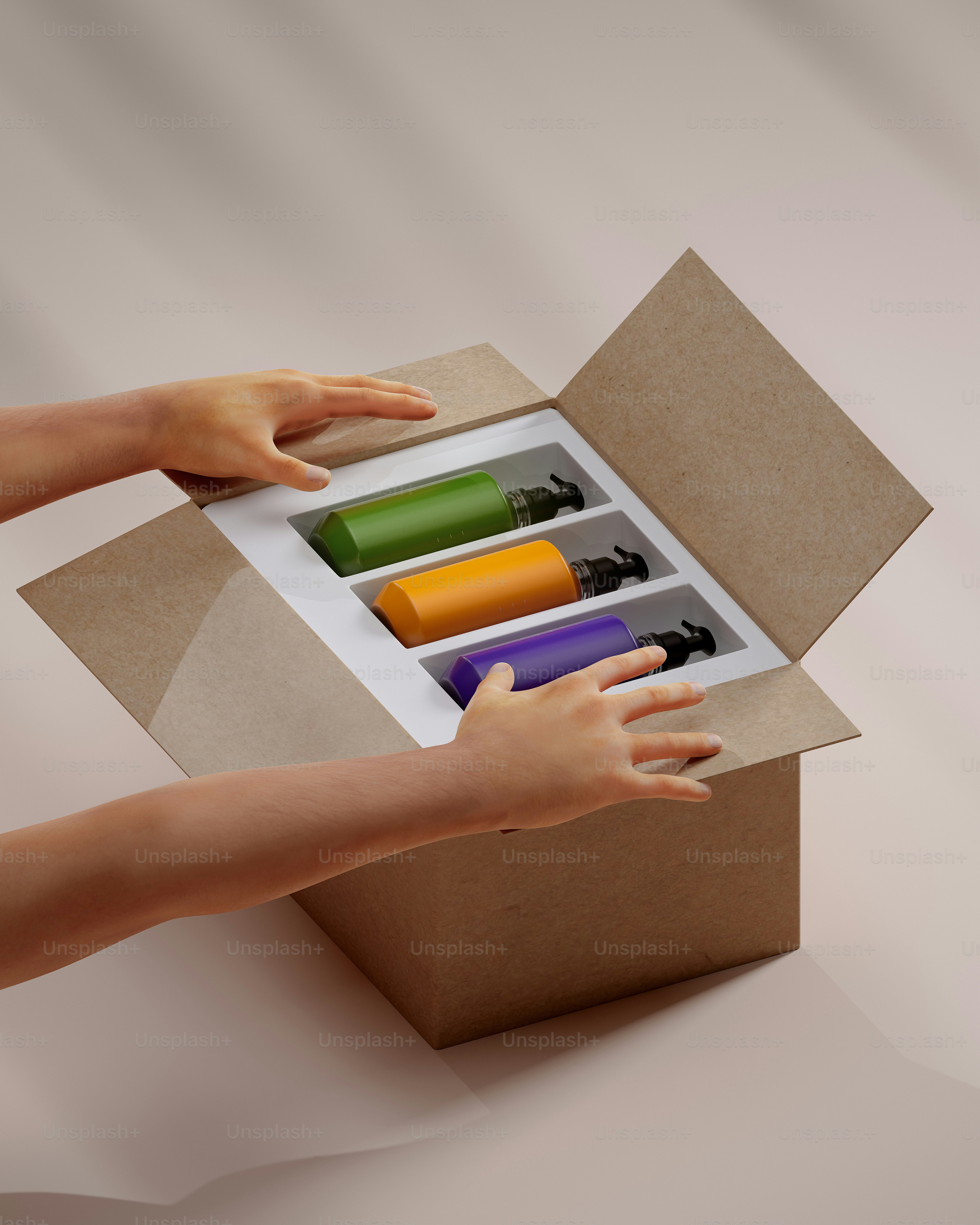 A woman's hand reaching into a cardboard box photo – Product Image on ...