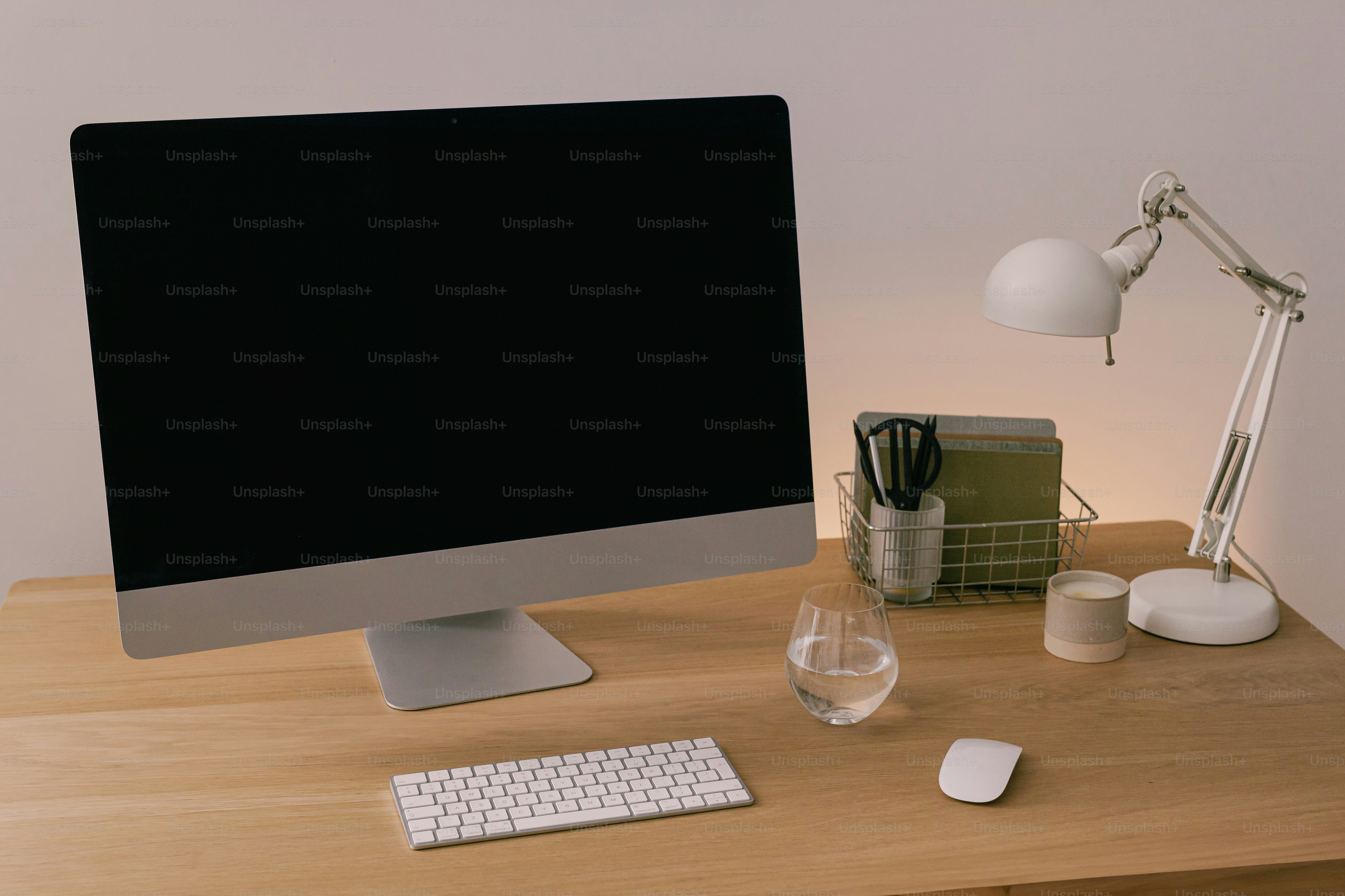 A laptop computer sitting on top of a wooden desk photo – Home office ...